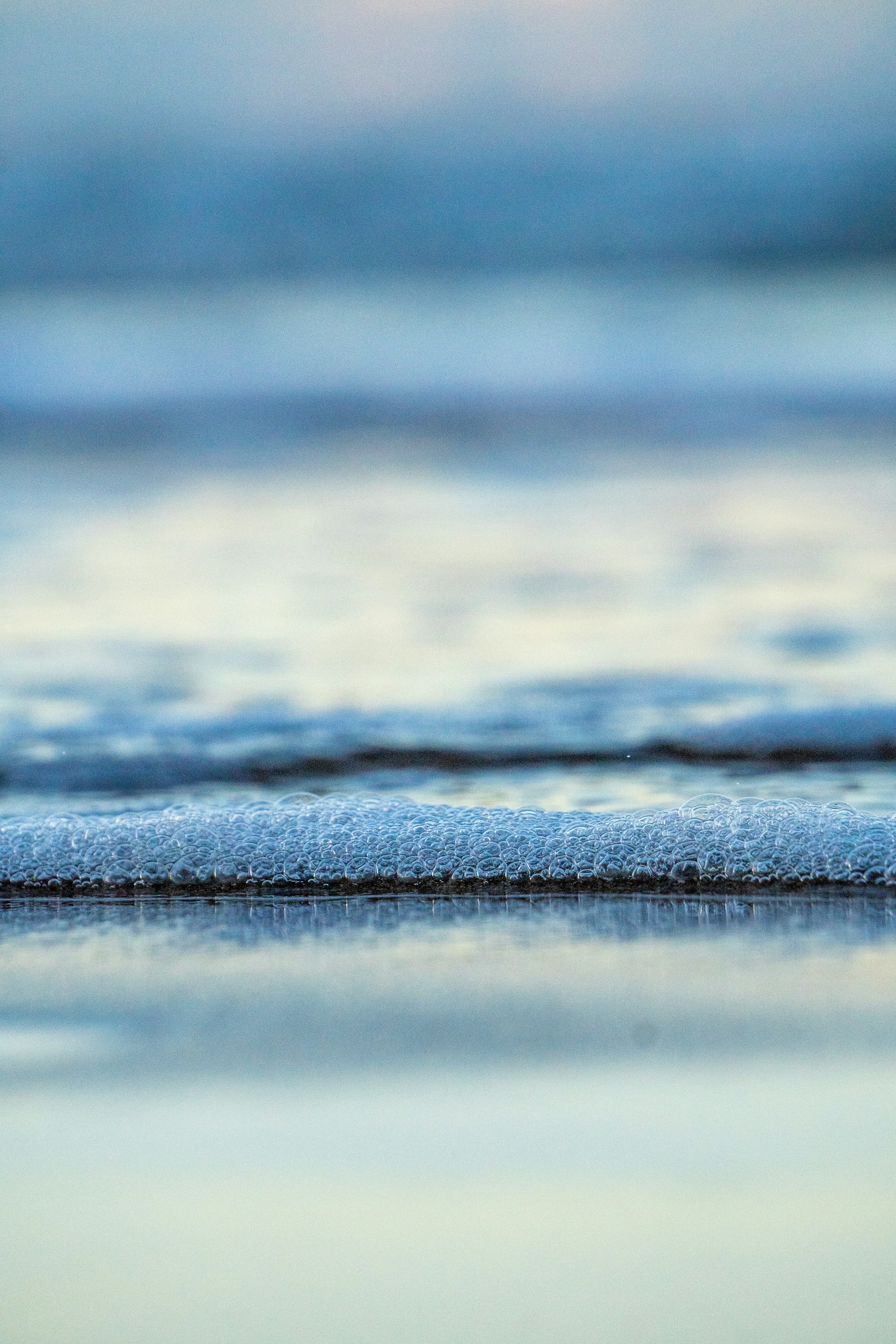 A body of water with ice and snow on it photo – Free Ouddorp Image on ...