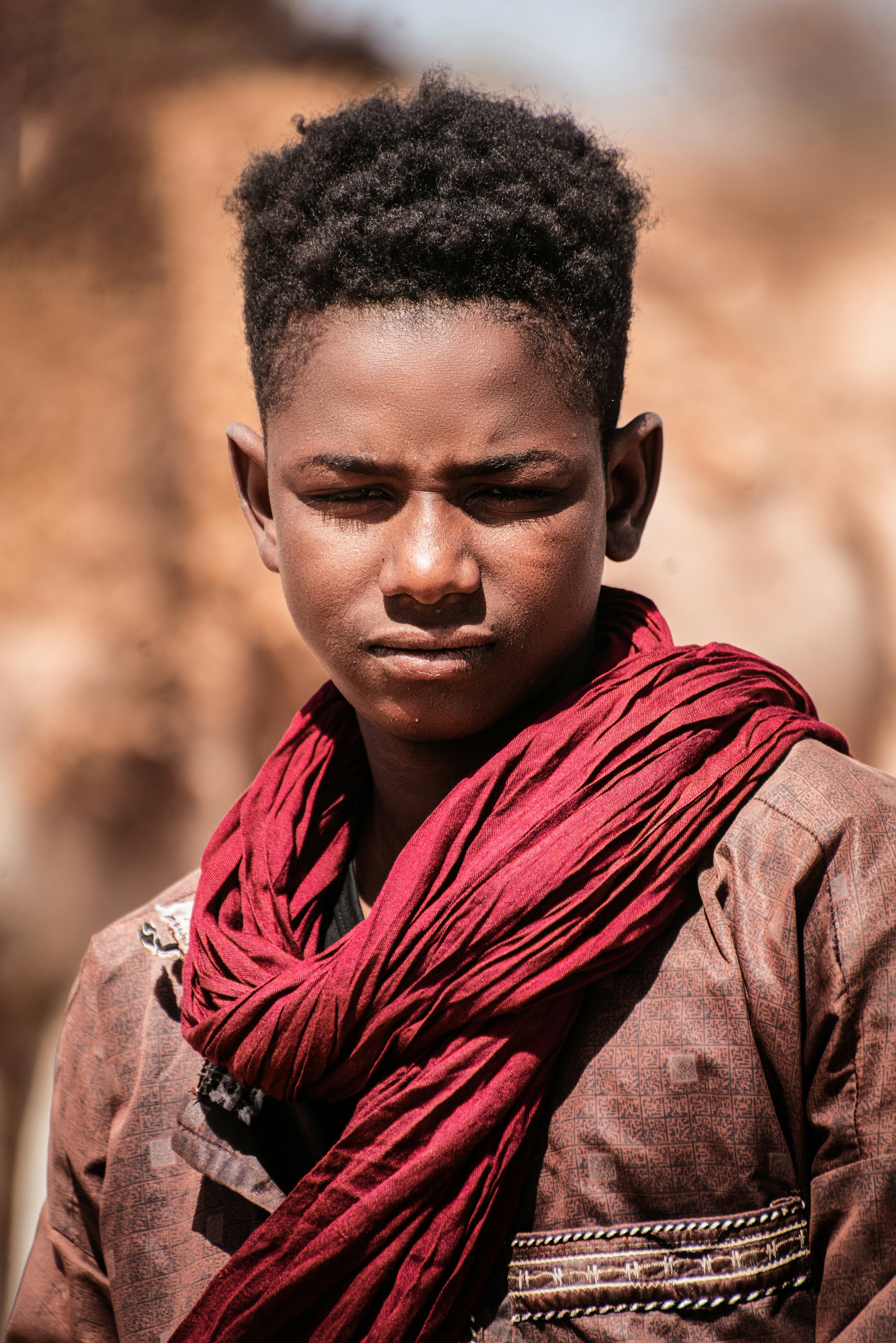 A man with a scarf around his neck photo – Free Scarf Image on Unsplash