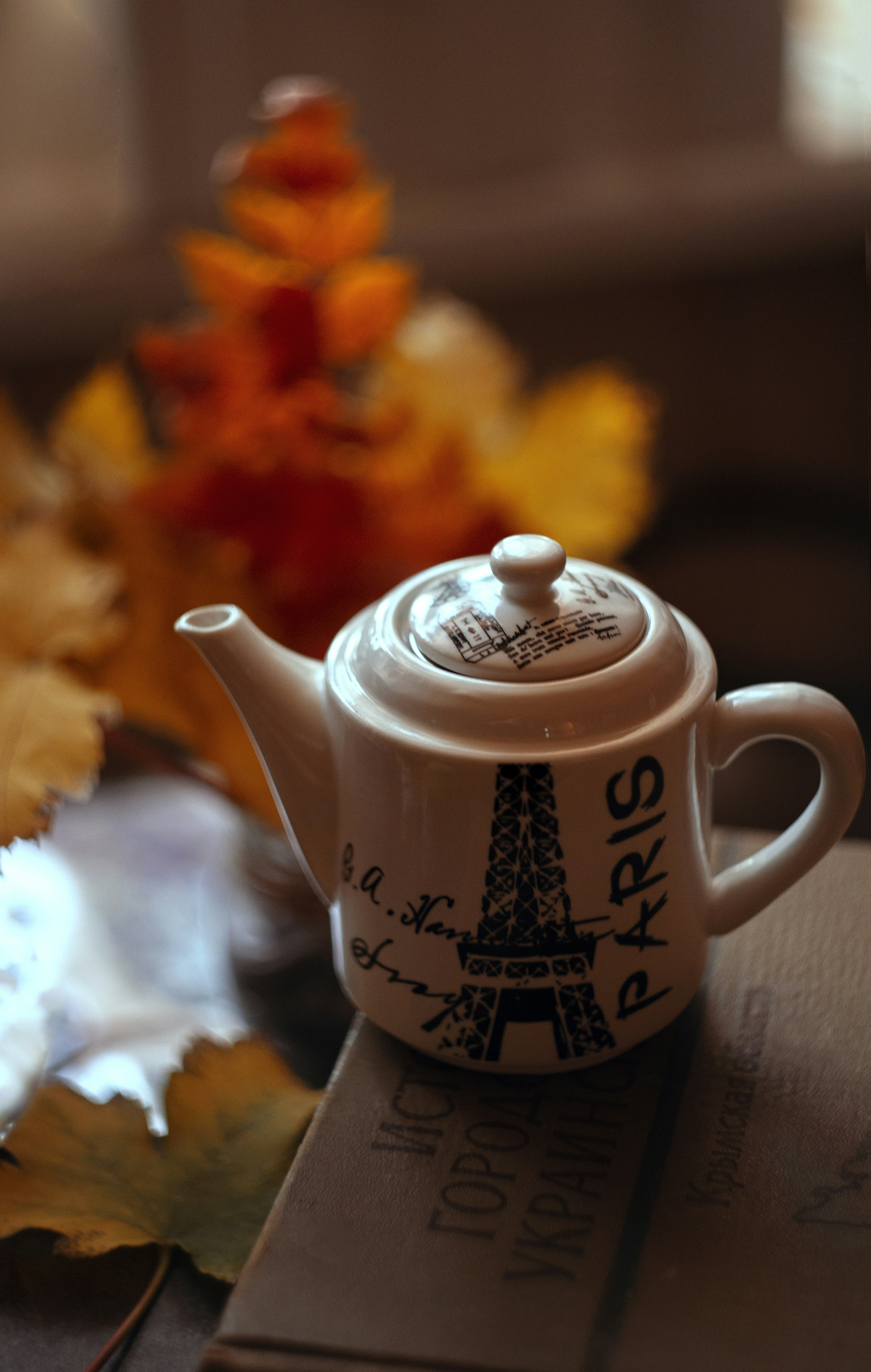 Teapot with Eiffel Silhouette: Autumn Light on a Quiet Table