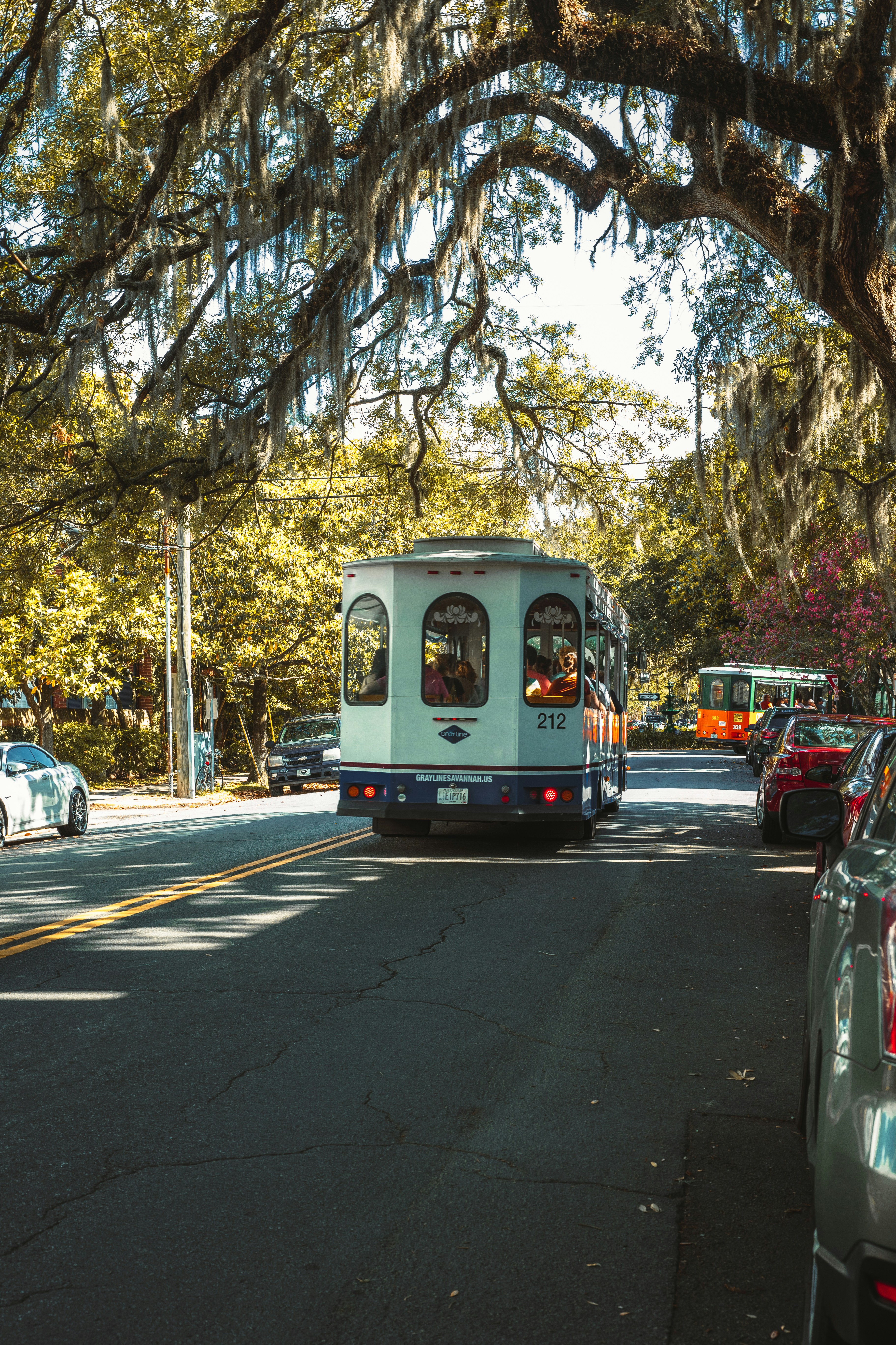a bus travels down the street