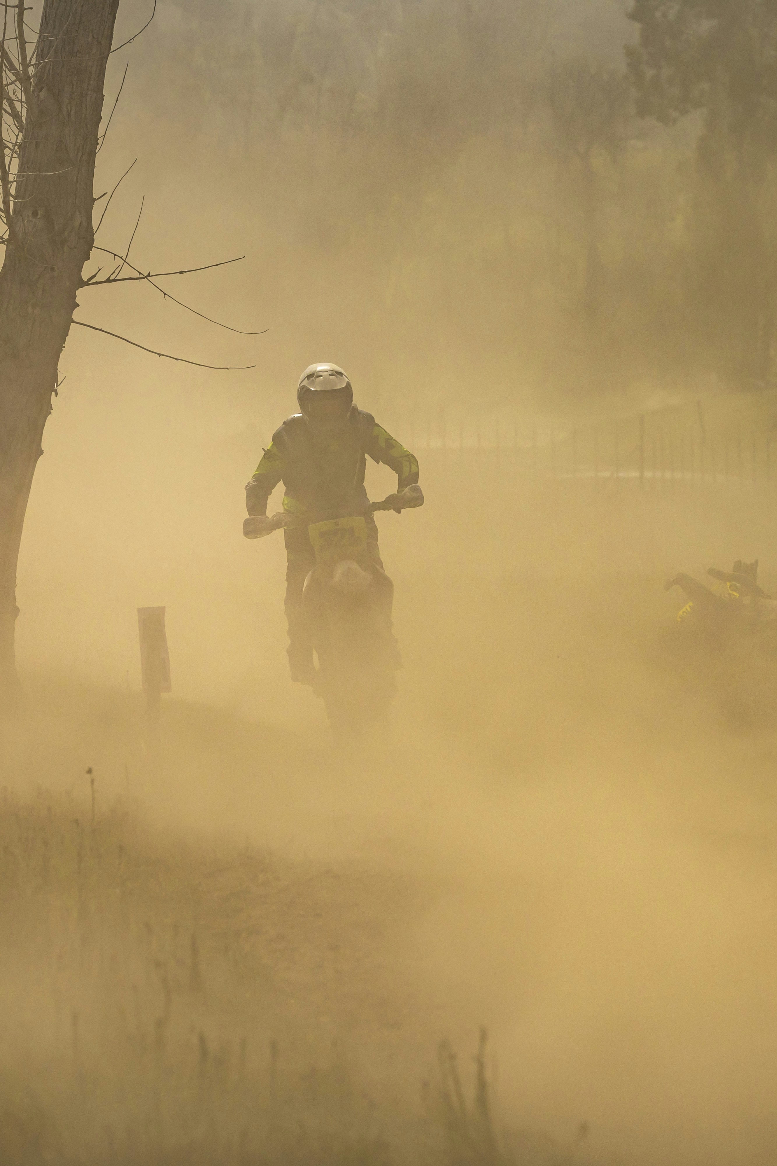 A person riding a motorcycle in the fog photo – Free Dirt bike Image on ...