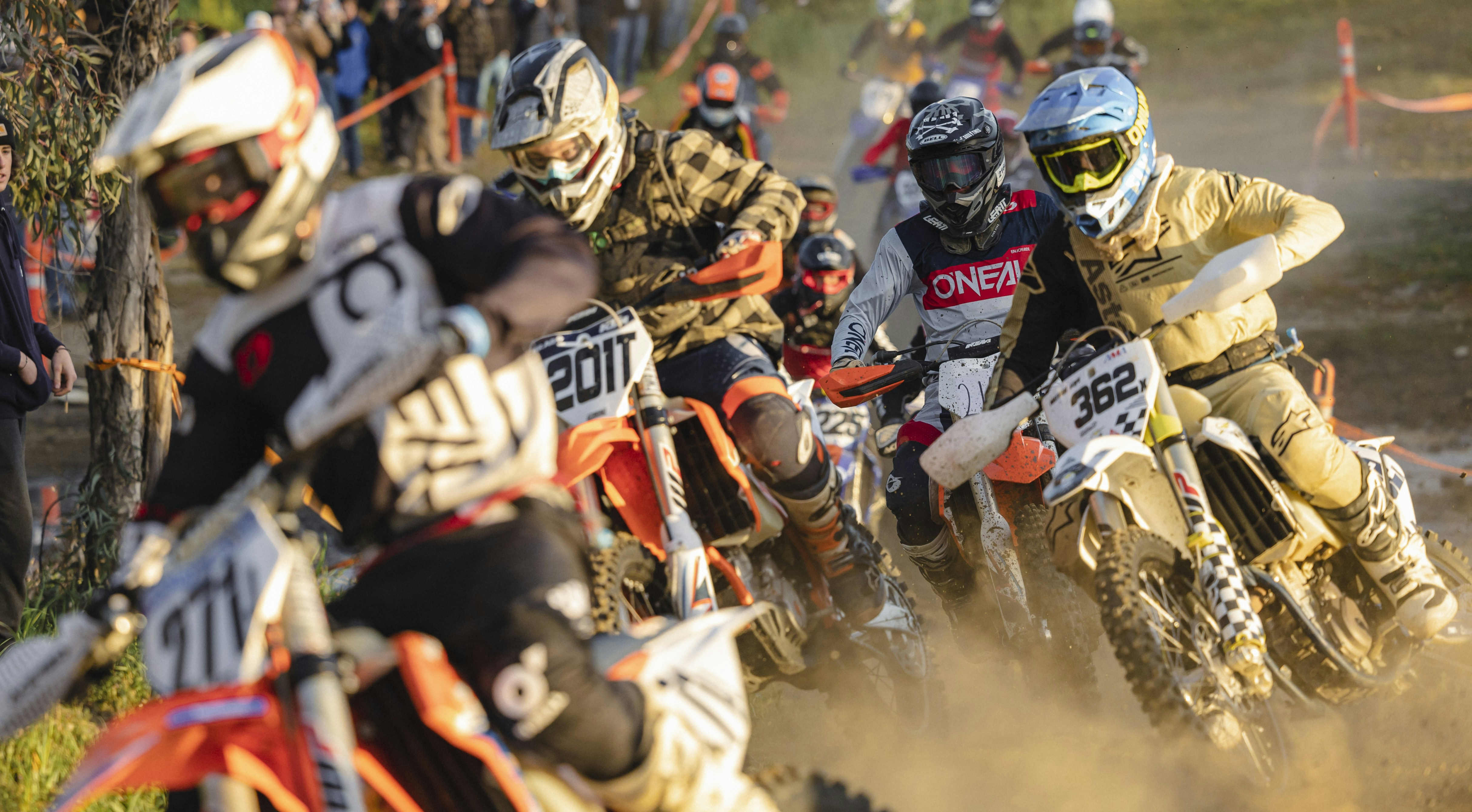 A group of people racing on dirt bikes photo – Free Dirt bike Image on ...