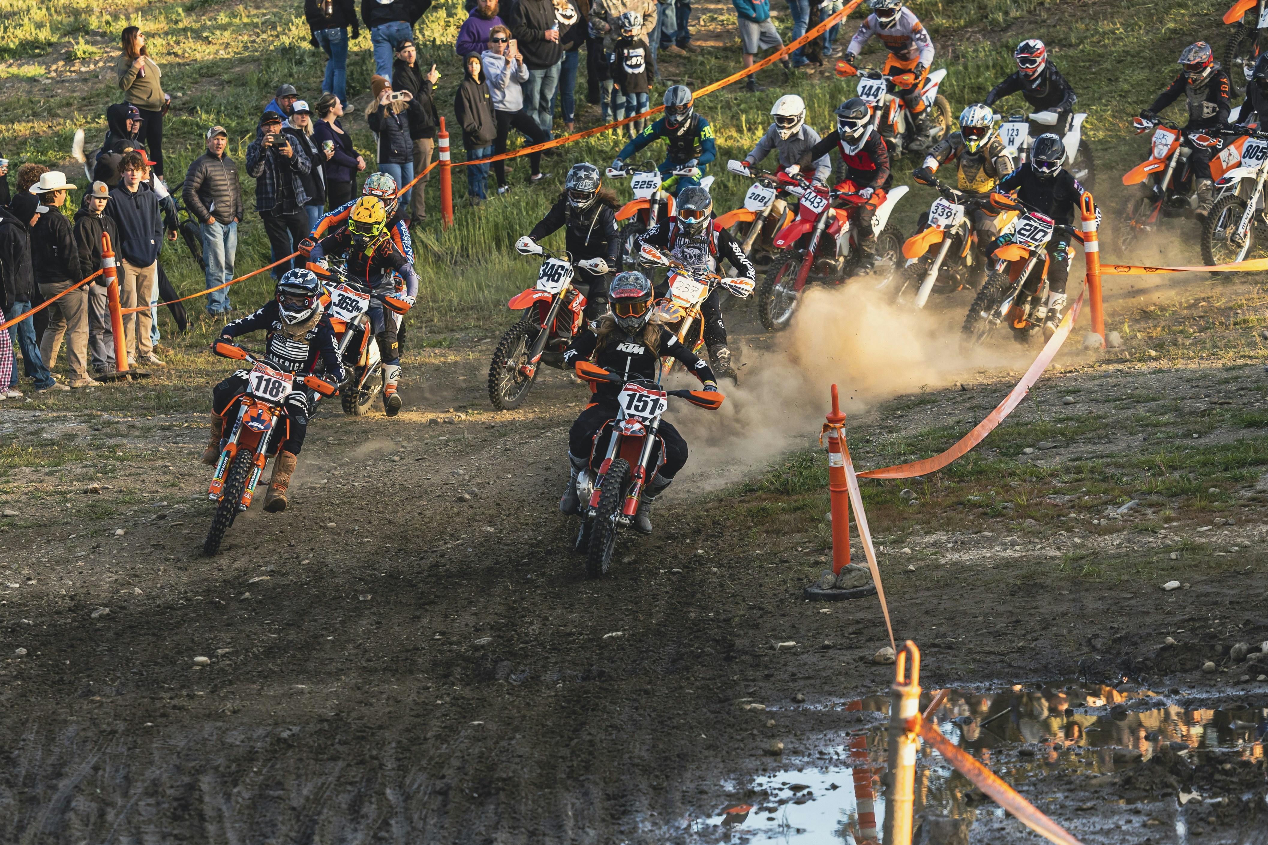 A group of people riding dirt bikes photo – Free Dirt bike Image on ...