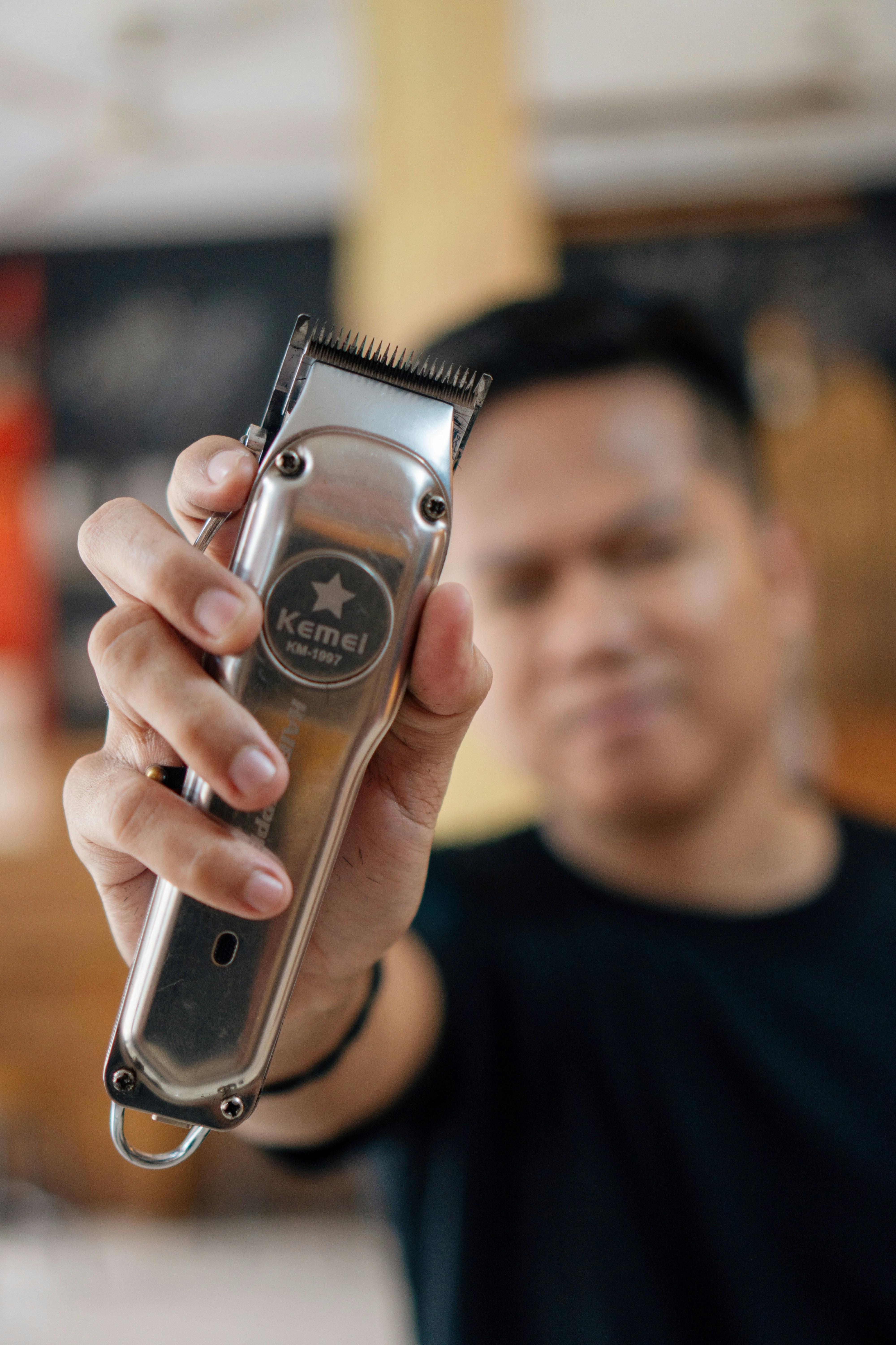 Close-up of a barber-scissor clipper presented toward the camera