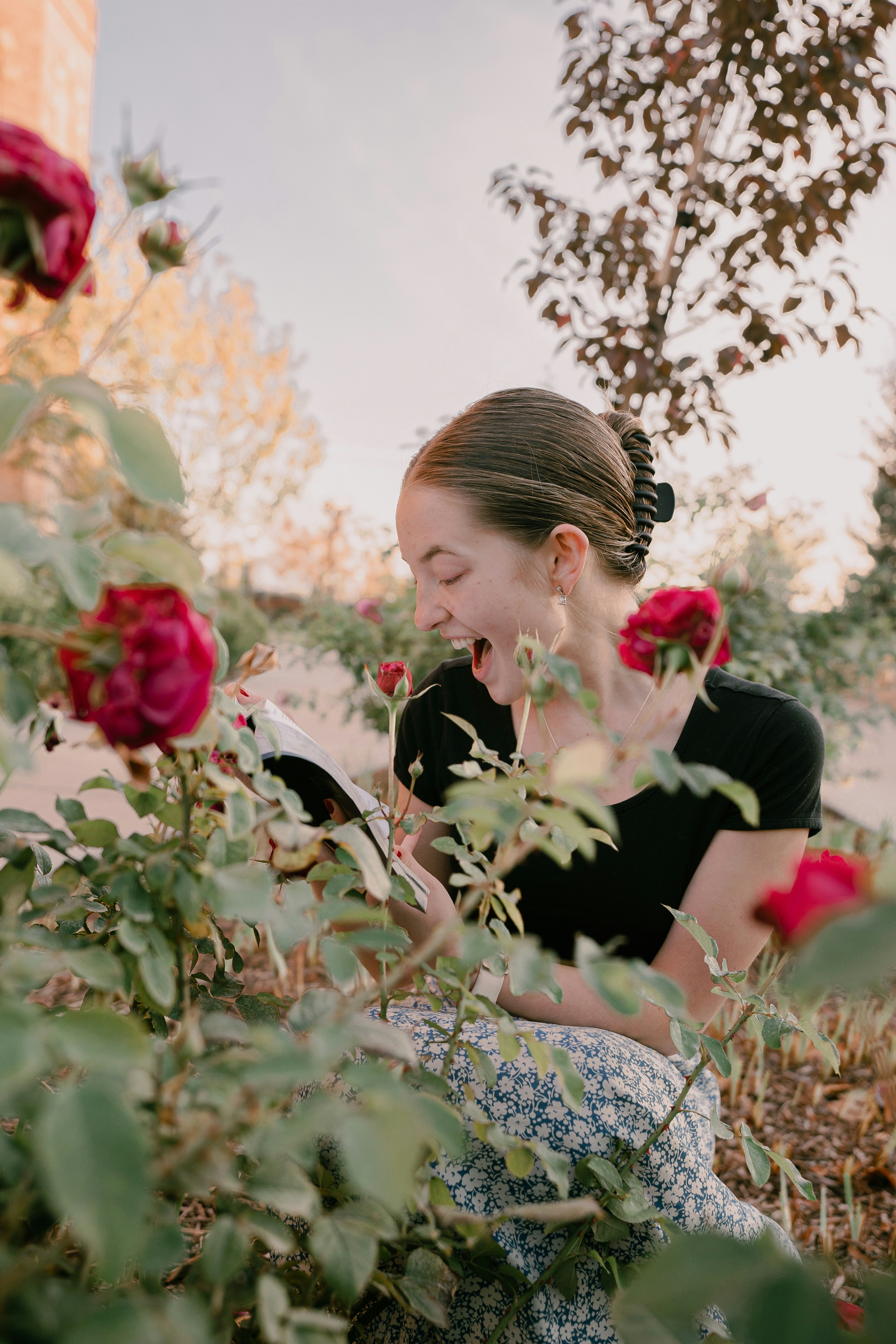 Rose-Garden Moment: A Quiet Laugh Between Flowers