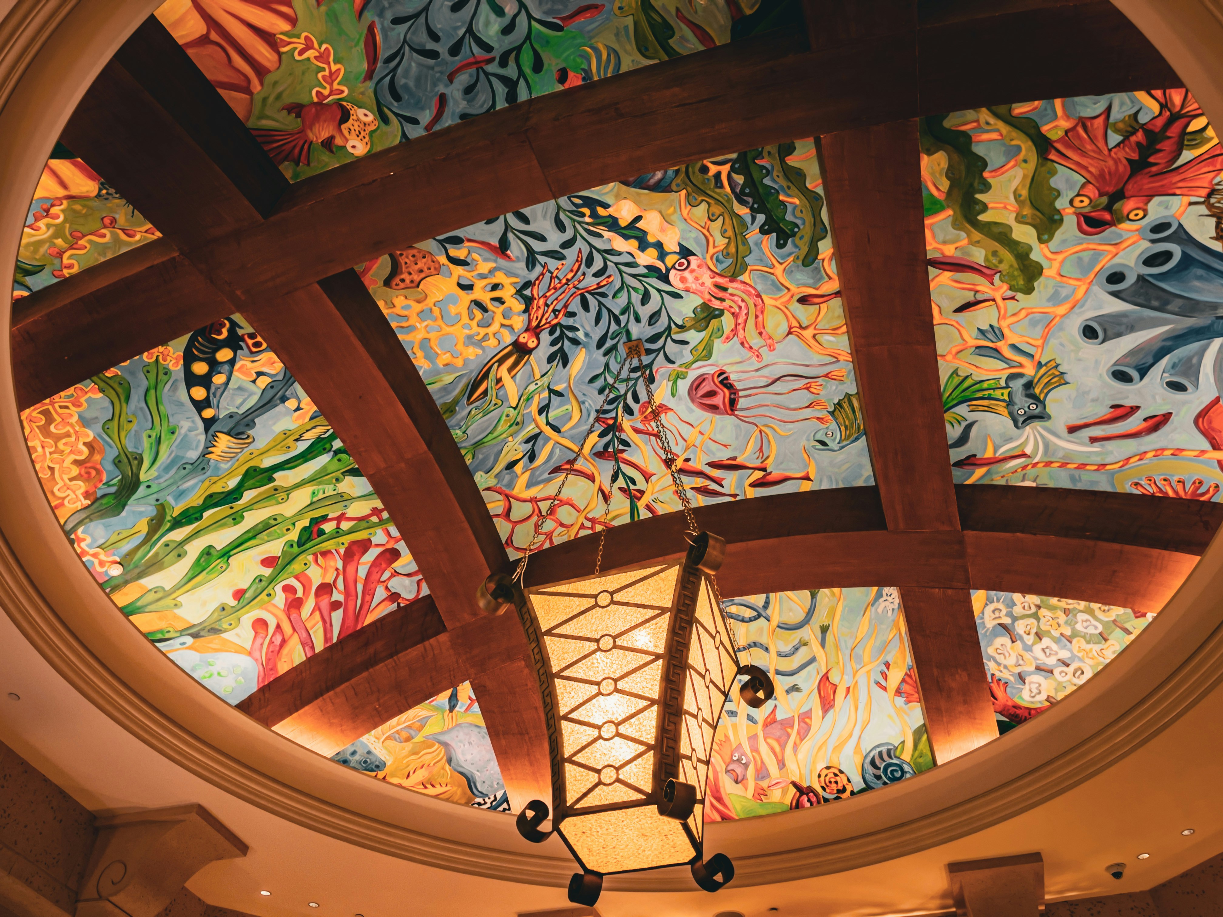 Lantern Centered in a Kaleidoscopic Timber Ceiling
