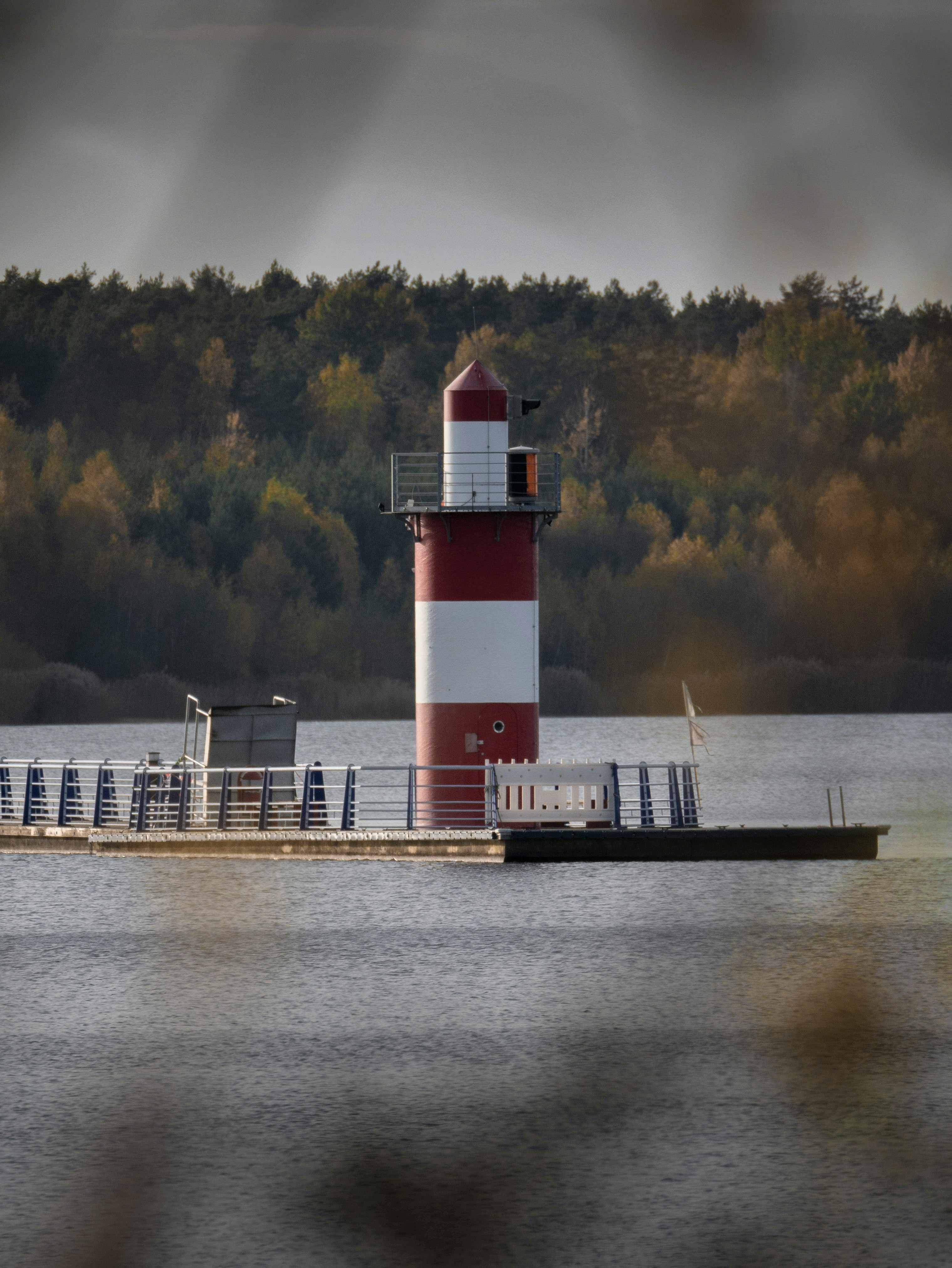 A lighthouse on a dock photo – Free Germany Image on Unsplash