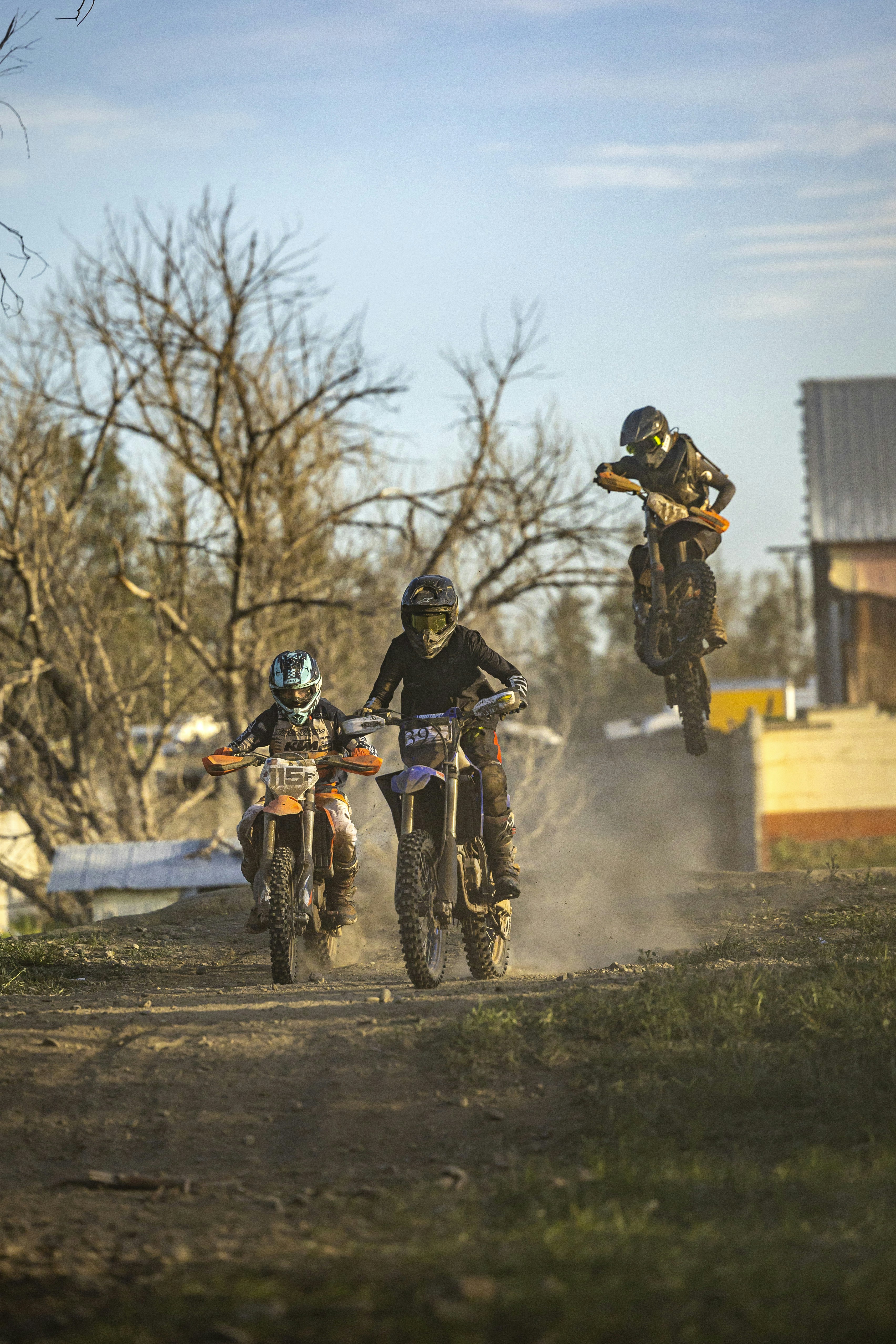 A group of people riding dirt bikes photo – Free Dirt bike Image on ...
