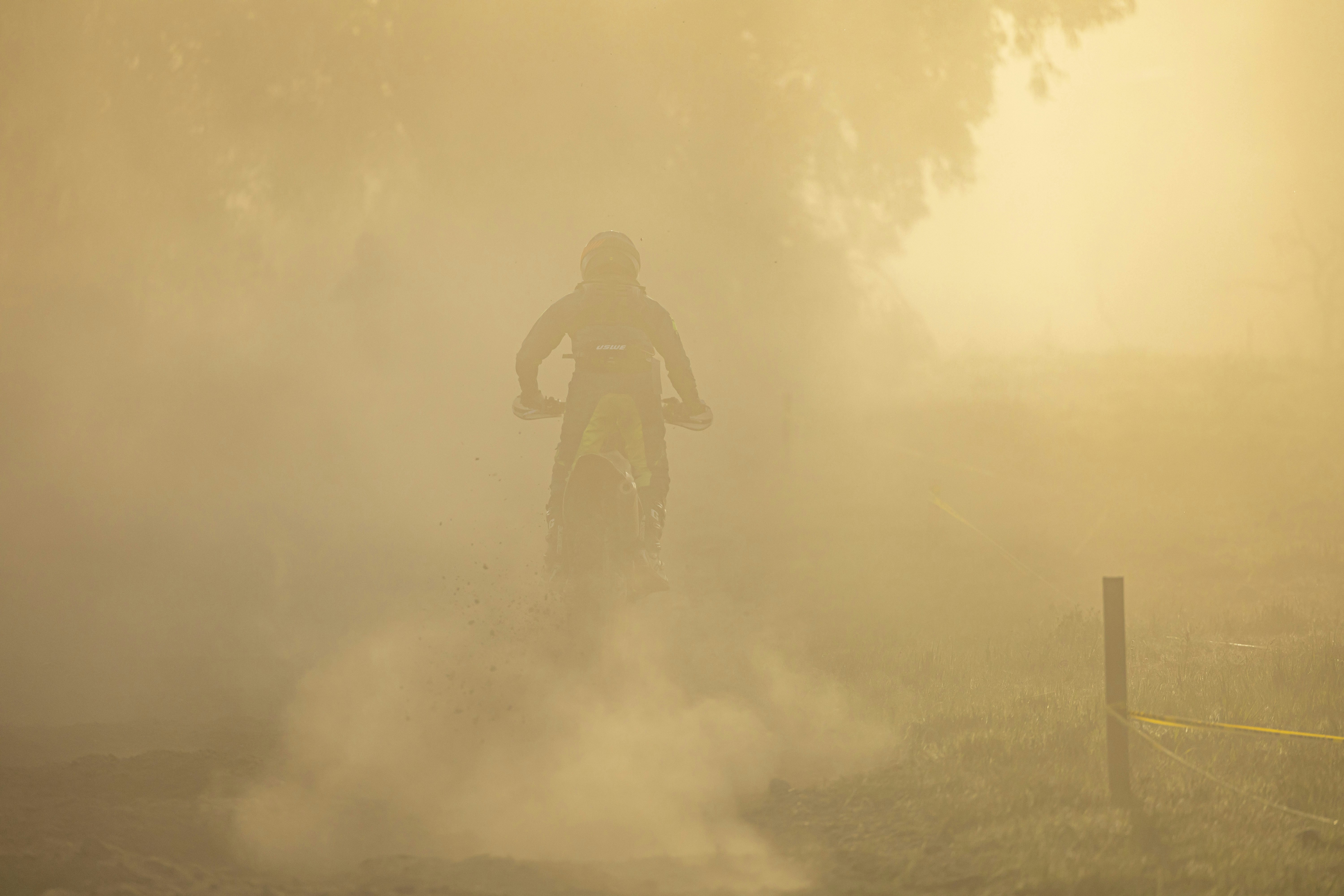 Dune of Dust: Rider Emerges through Golden Fog