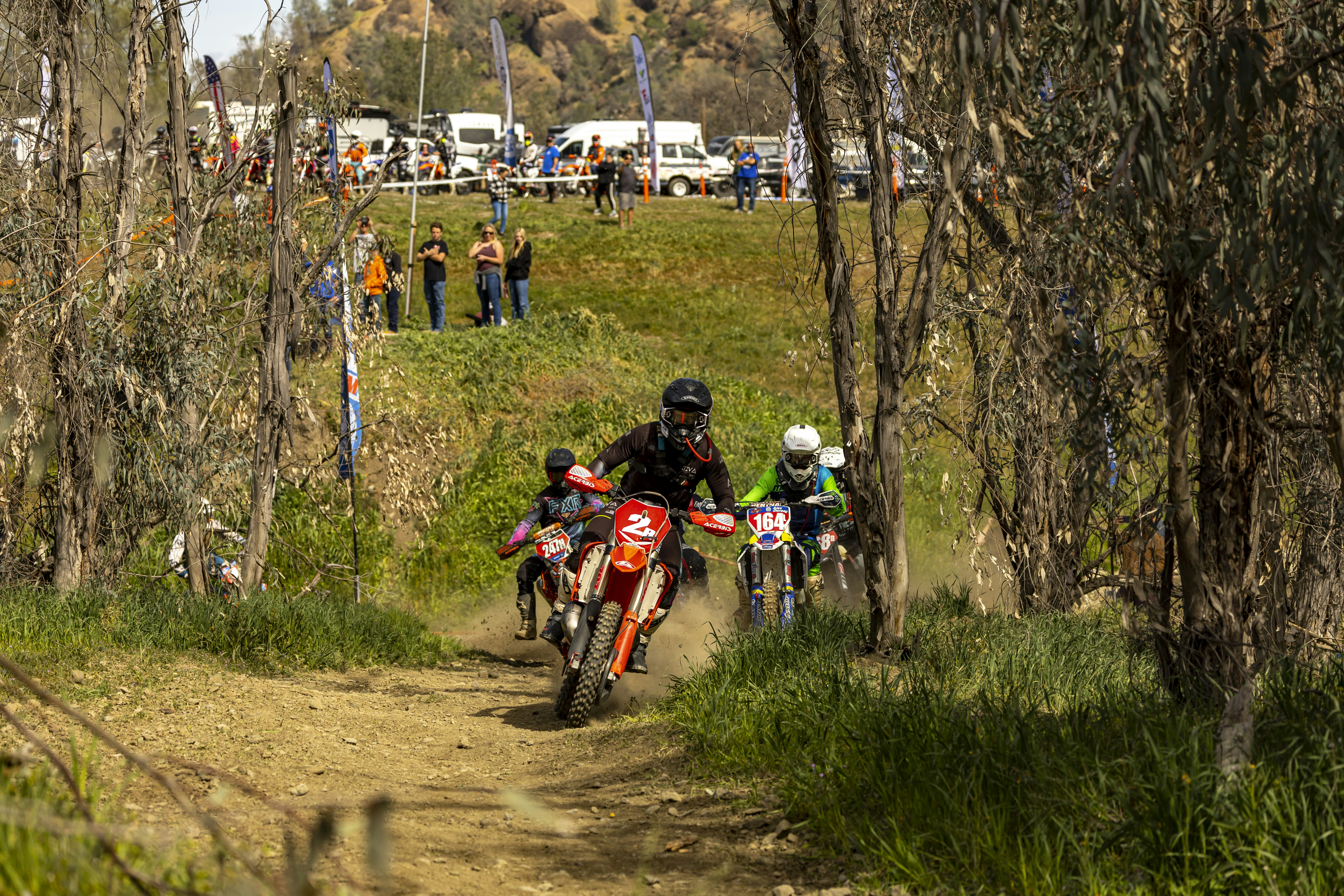 A group of people riding dirt bikes photo – Free Dirt bike Image on ...