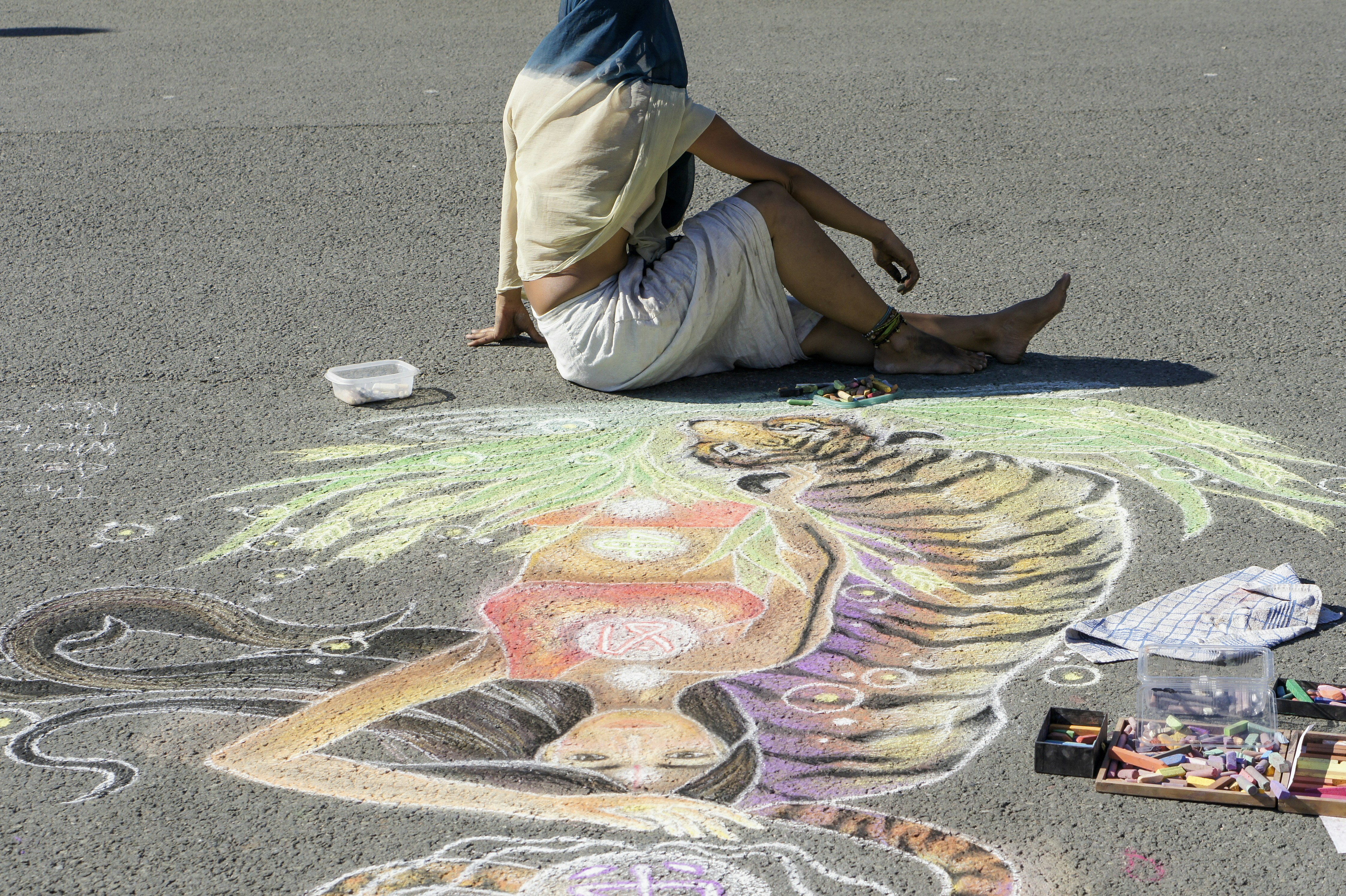 Sidewalk Studio: Chalk Portrait in the Sunlit Street