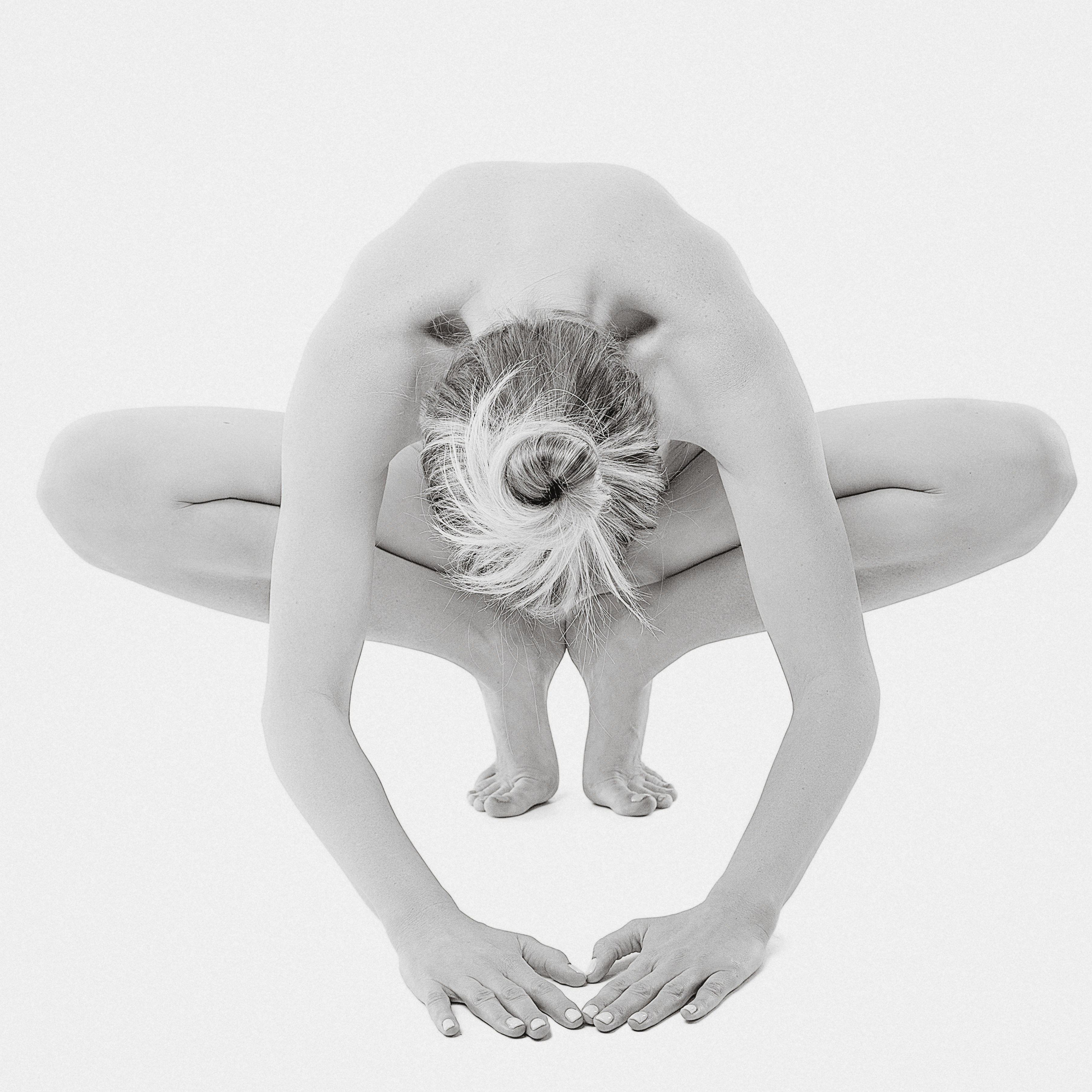 Gravity Fold: A Monochrome Nude in a Contorted, Yoga-Style Pose
