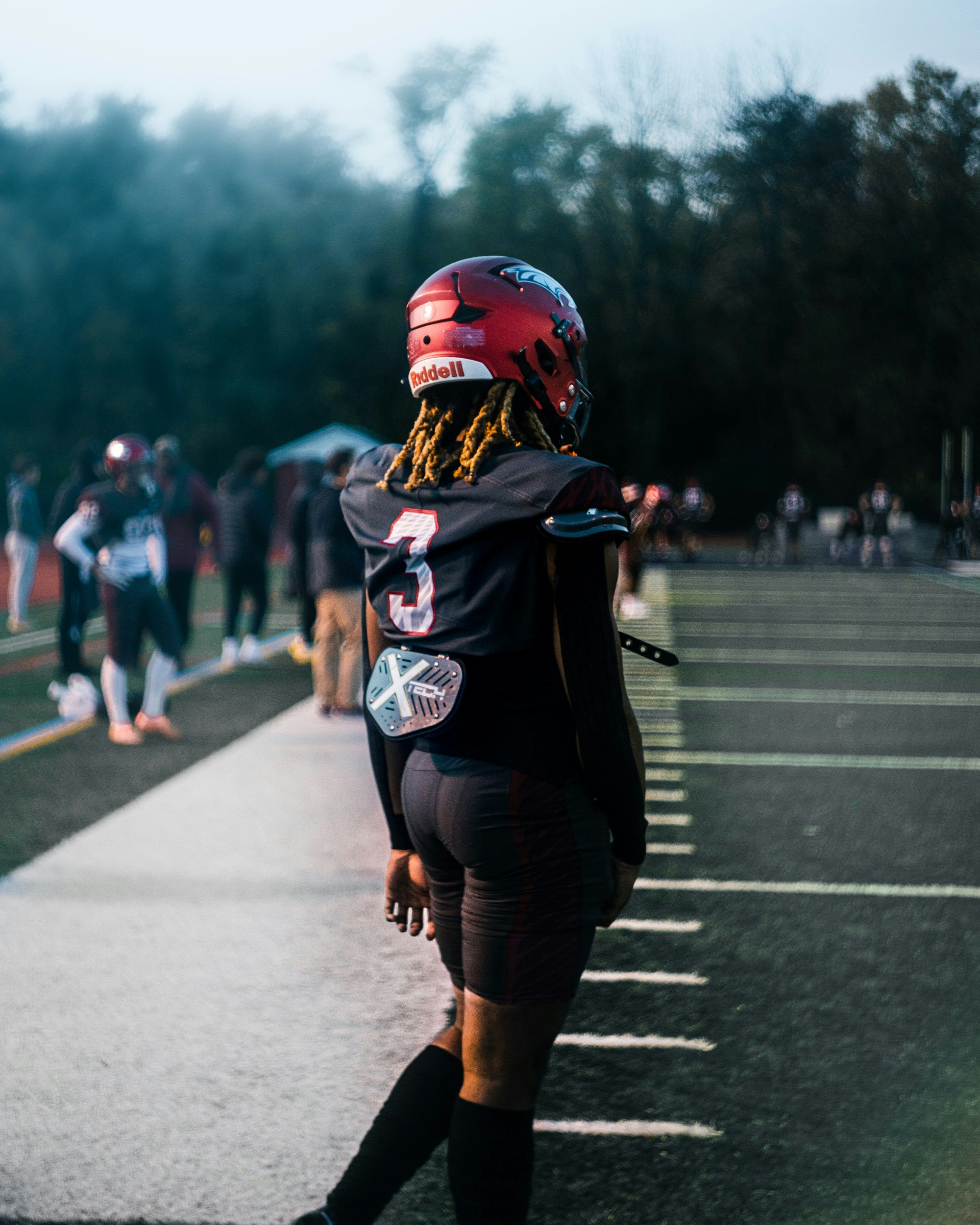Sidelined Focus: Portrait of a Player in Midnight Metallics
