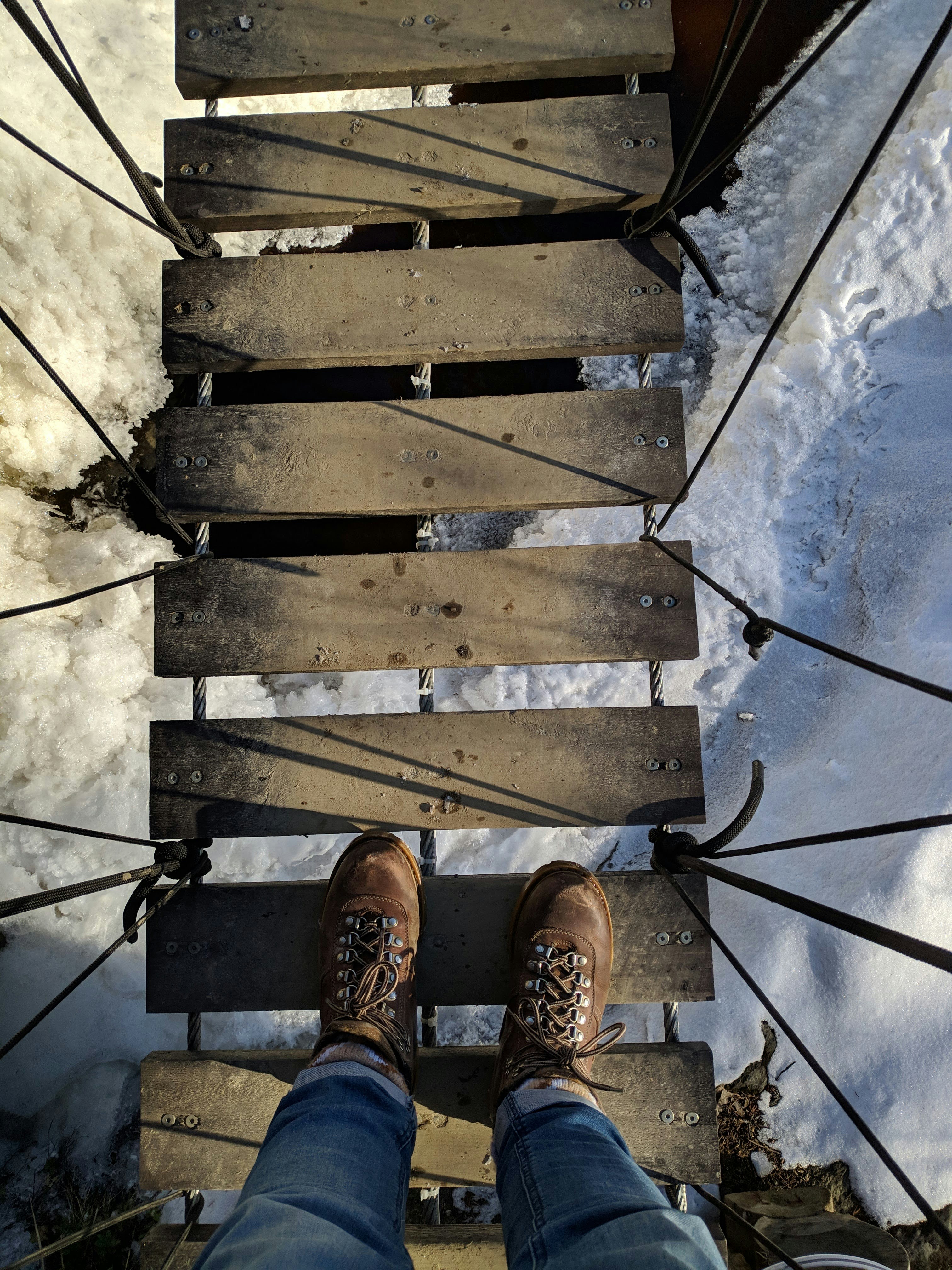 Steps of the Edge: A Snowy Descent from the Bridge