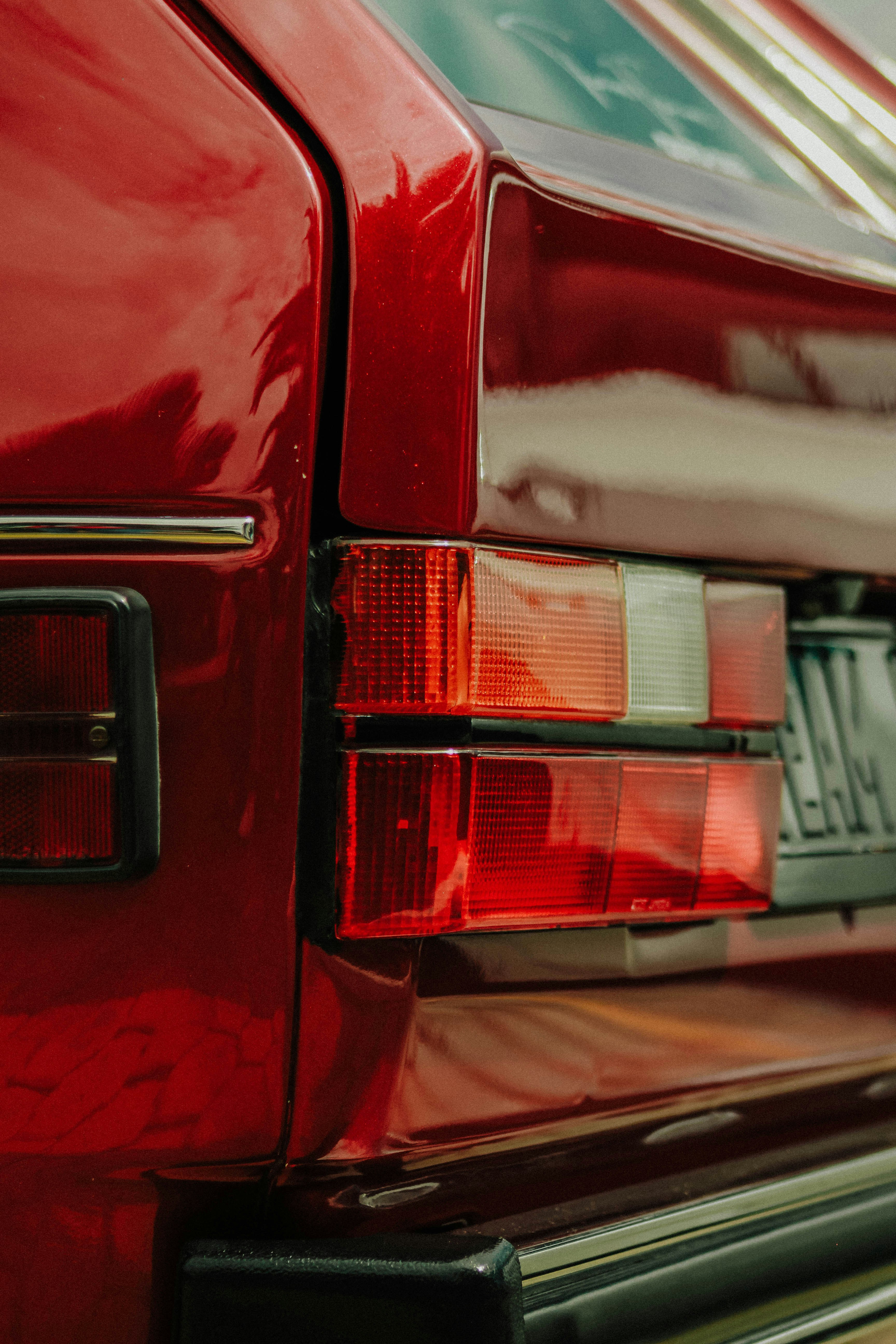 Red Tail Light Symphony on a Classic Hatchback