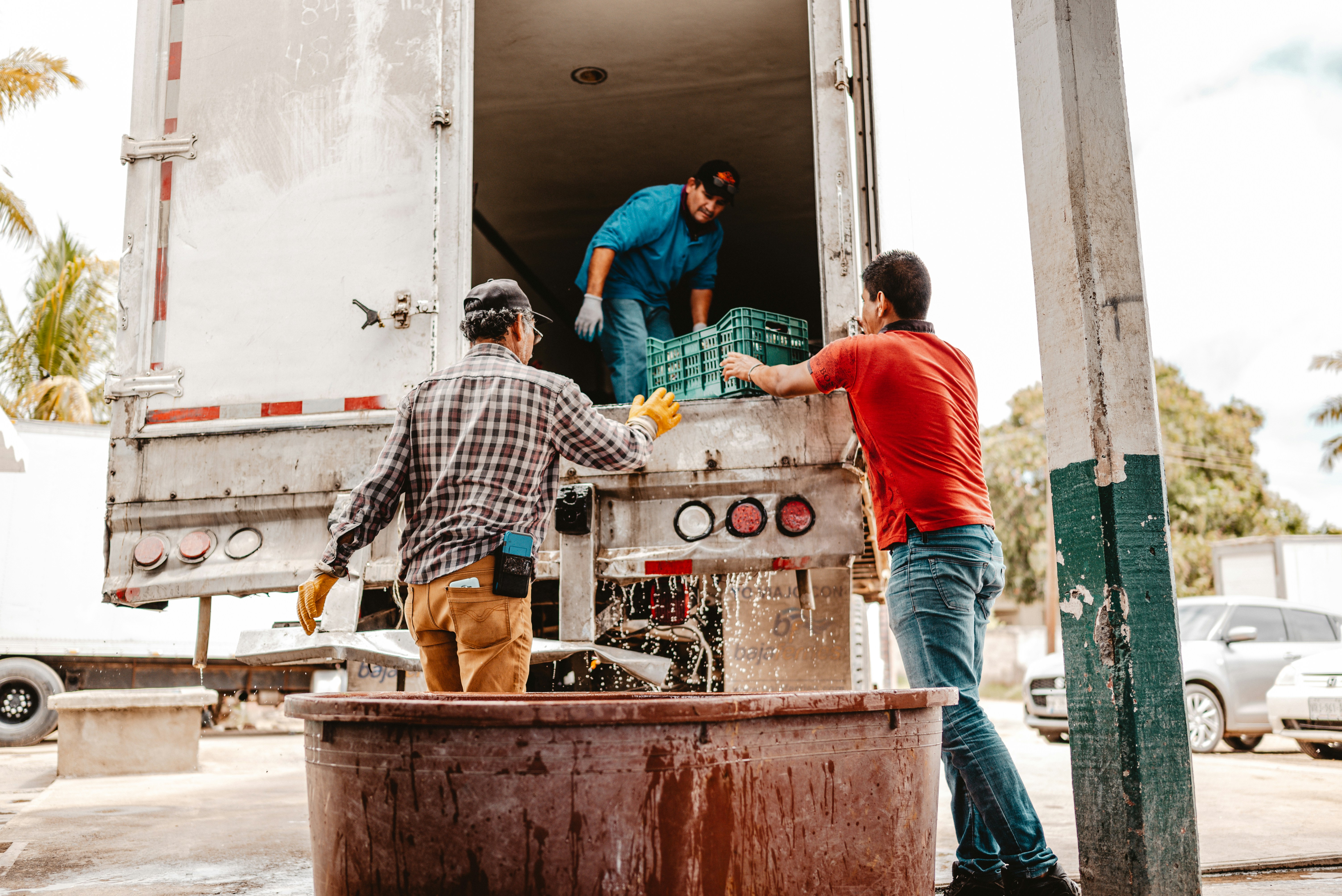 Men Working On A Truck