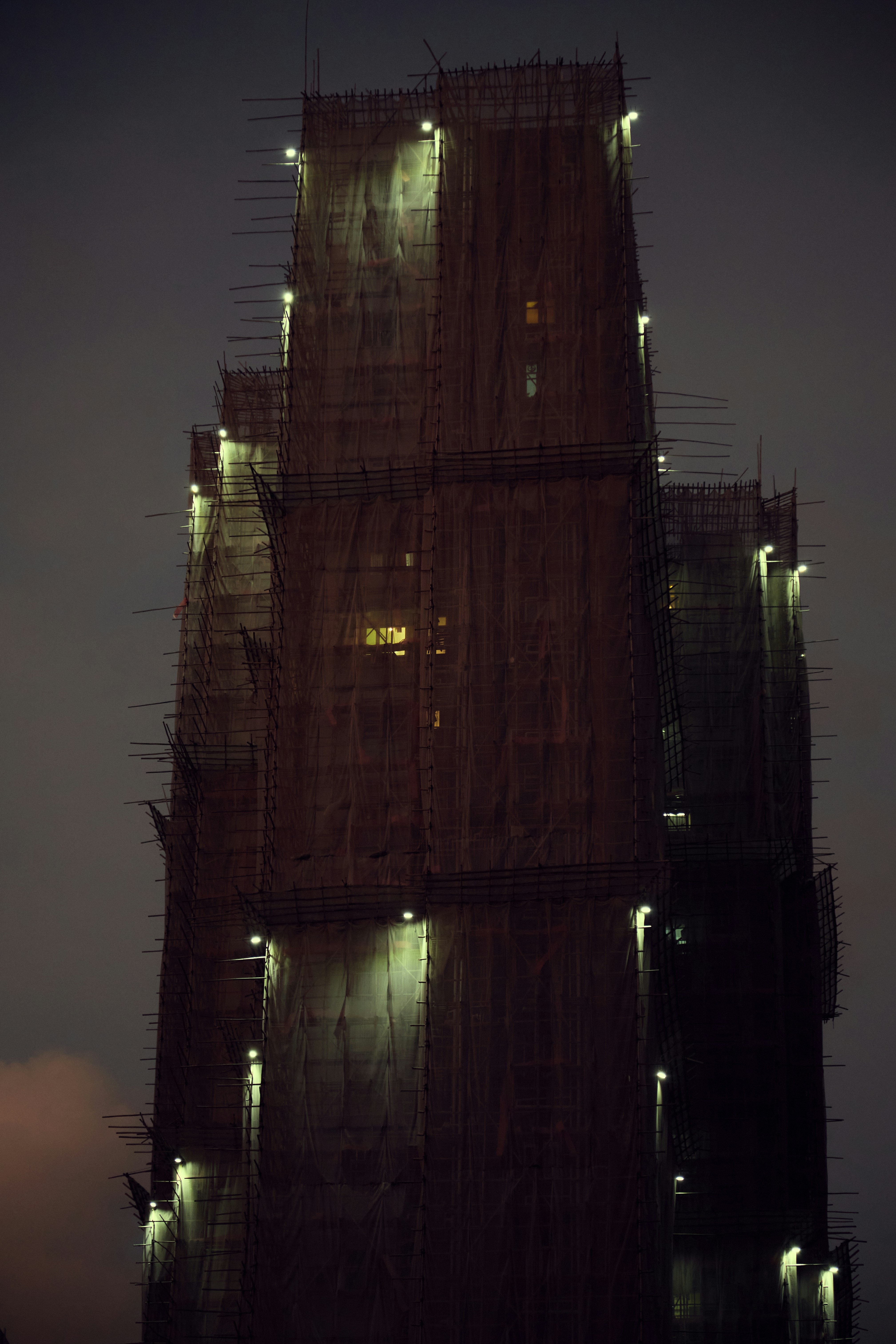Moonlit Skeleton of Steel: Under Construction in Night Fragments