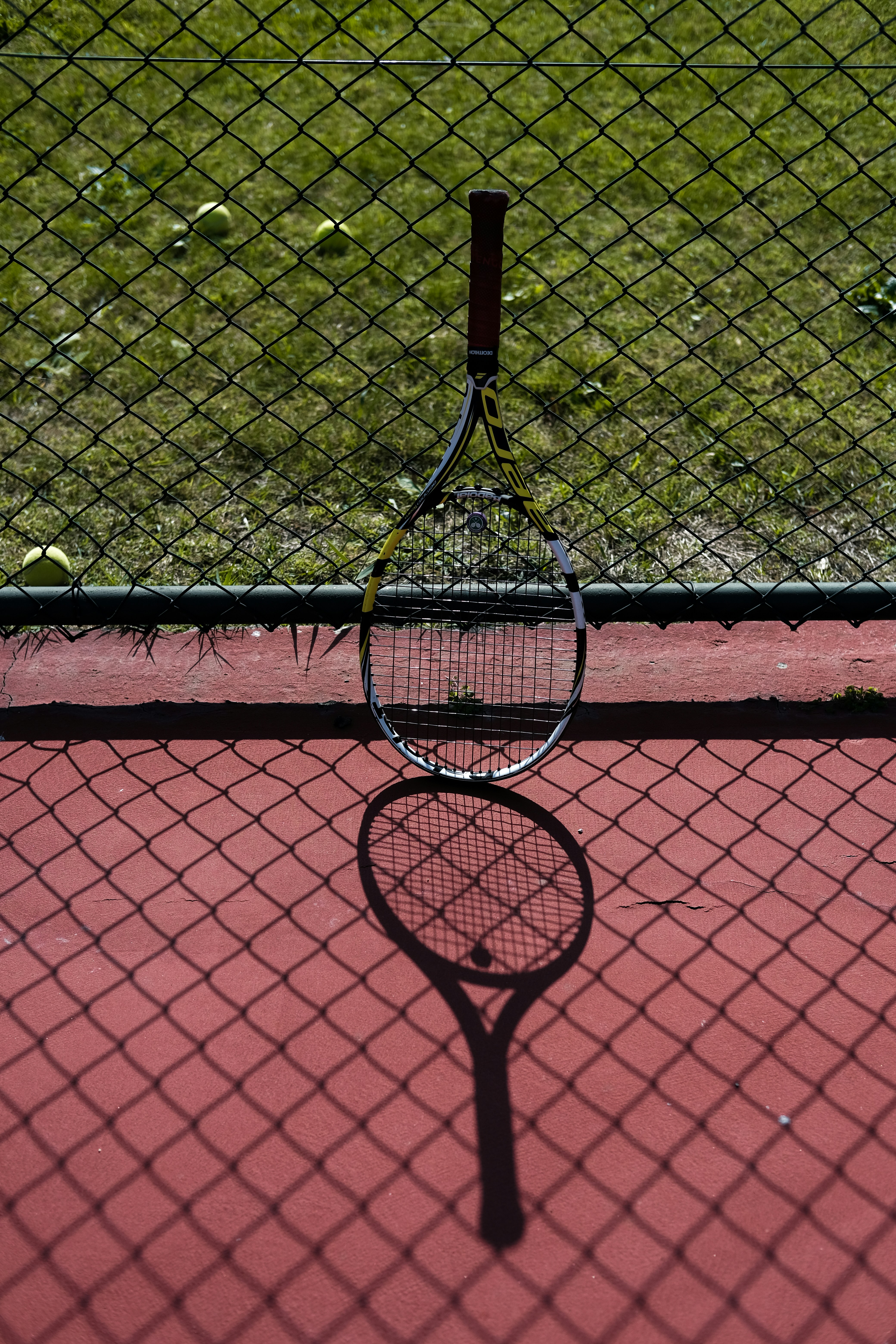 A tennis racket on a court photo – Free Image on Unsplash