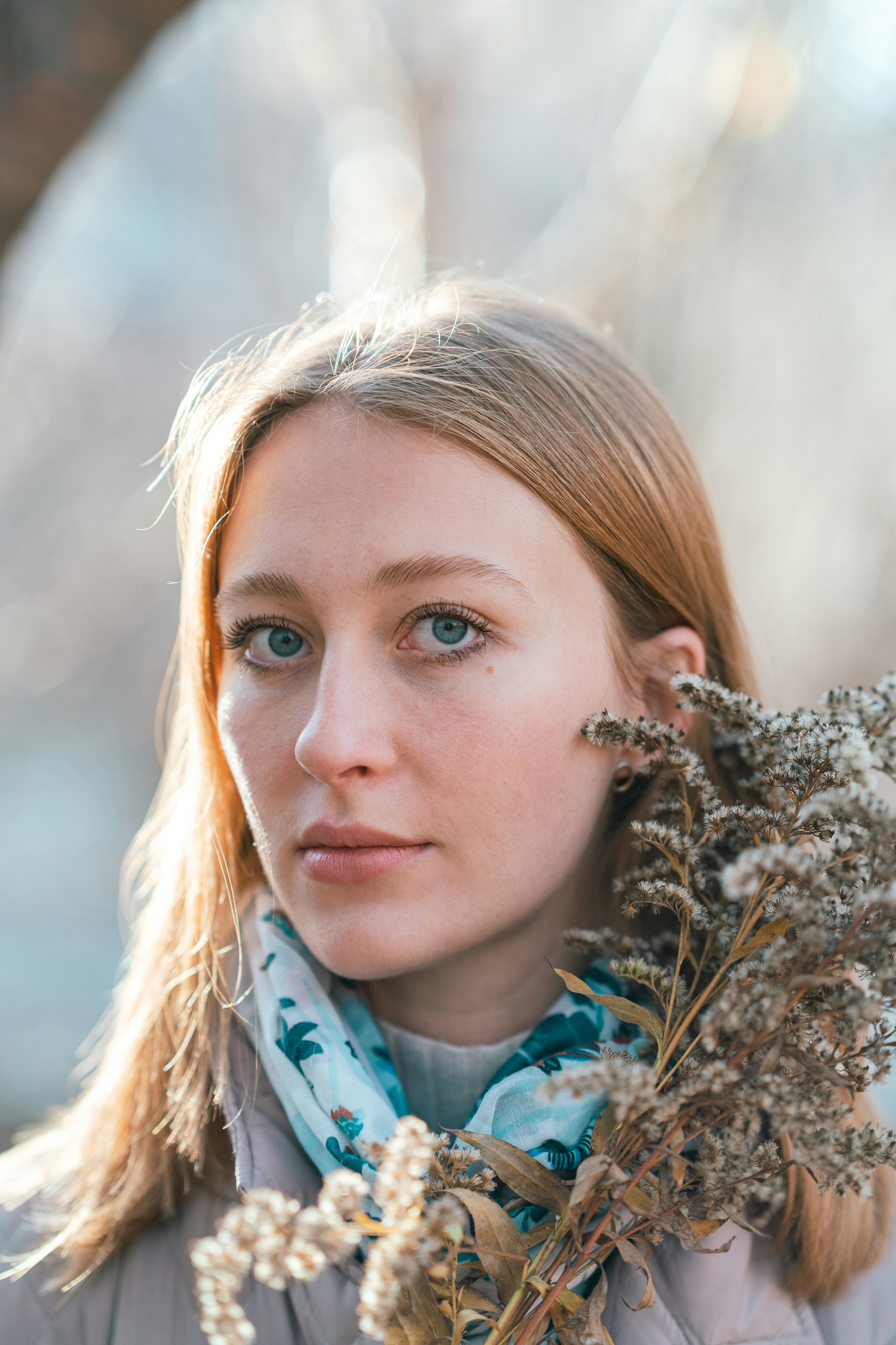 A woman with a scarf around her head photo – Free Face Image on Unsplash