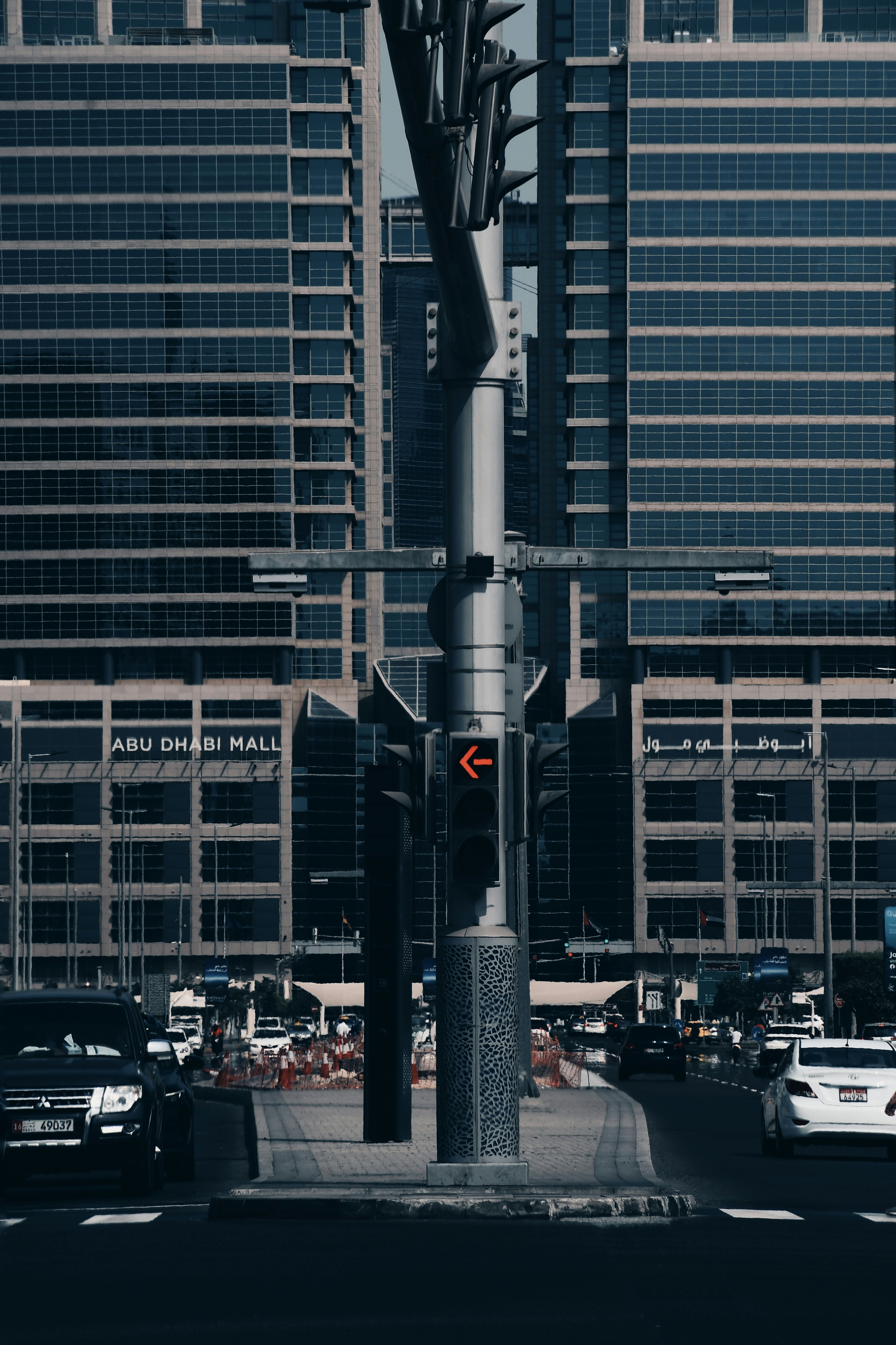 A street sign on a pole photo – Free Abu dhabi - united arab emirates ...