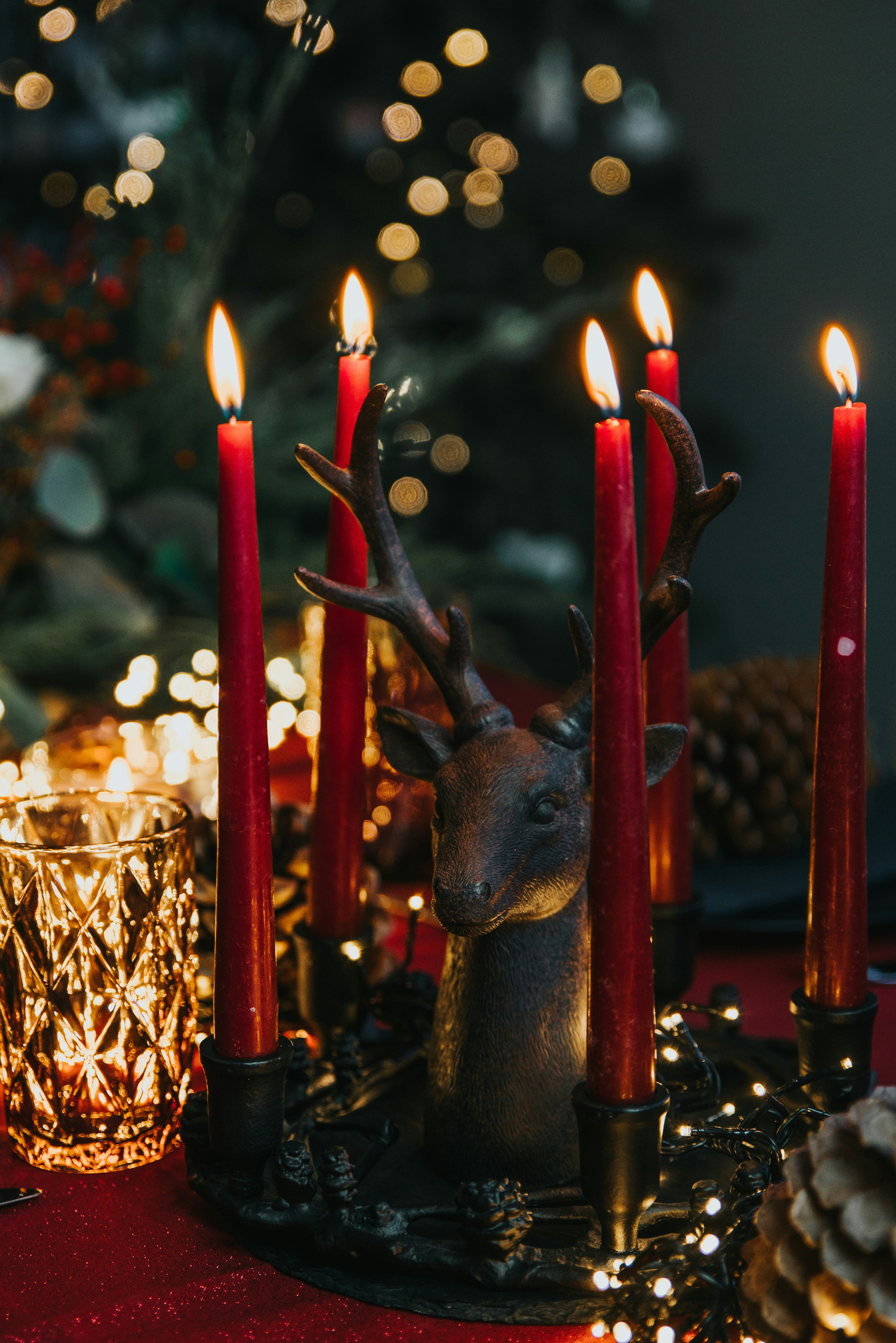 Candlelit Reindeer Centerpiece Amid Warm Bokeh