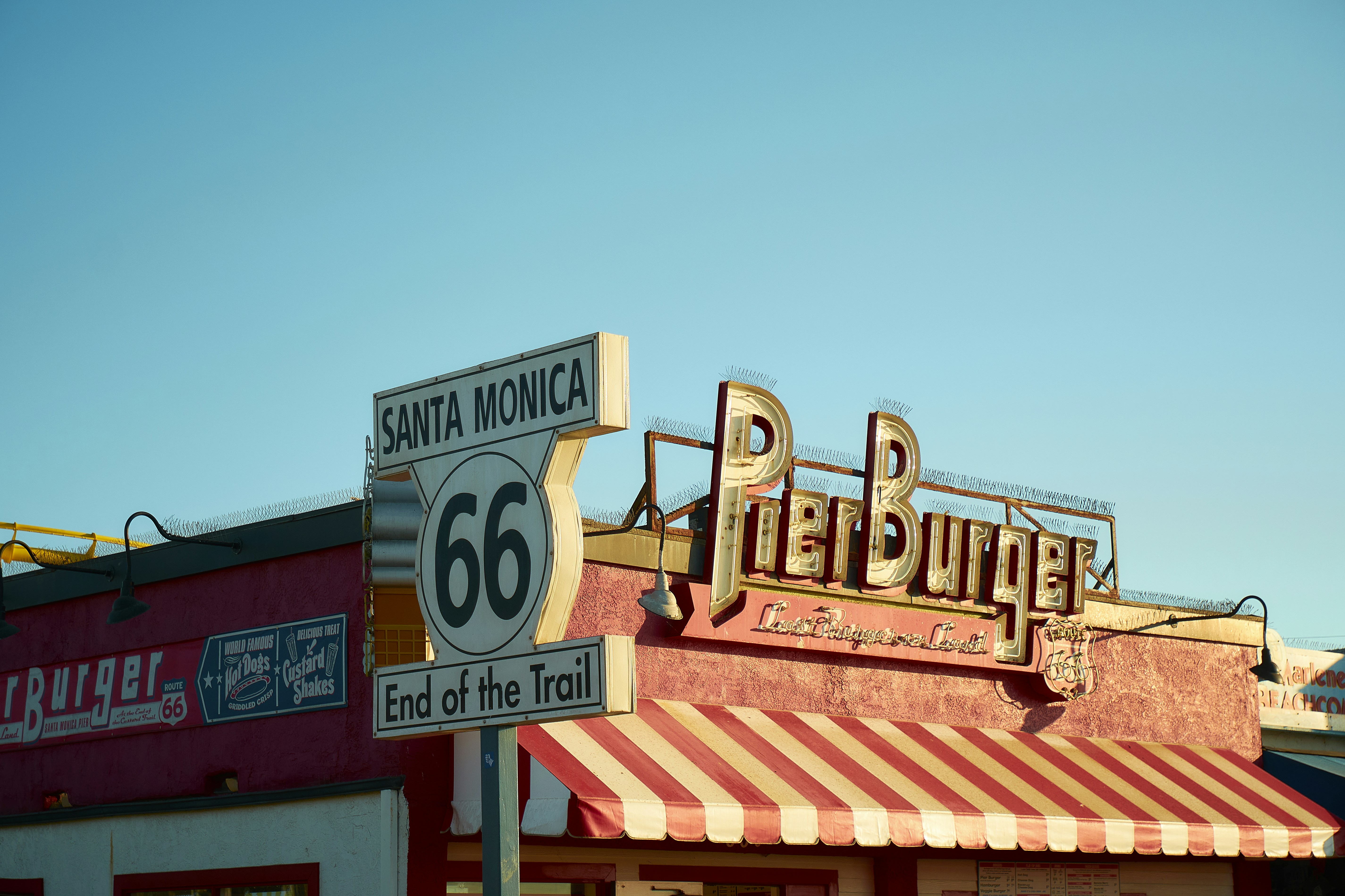 Route to the Drive-In: Neon Sign and Route 66 Mark the Santa Monica Sun