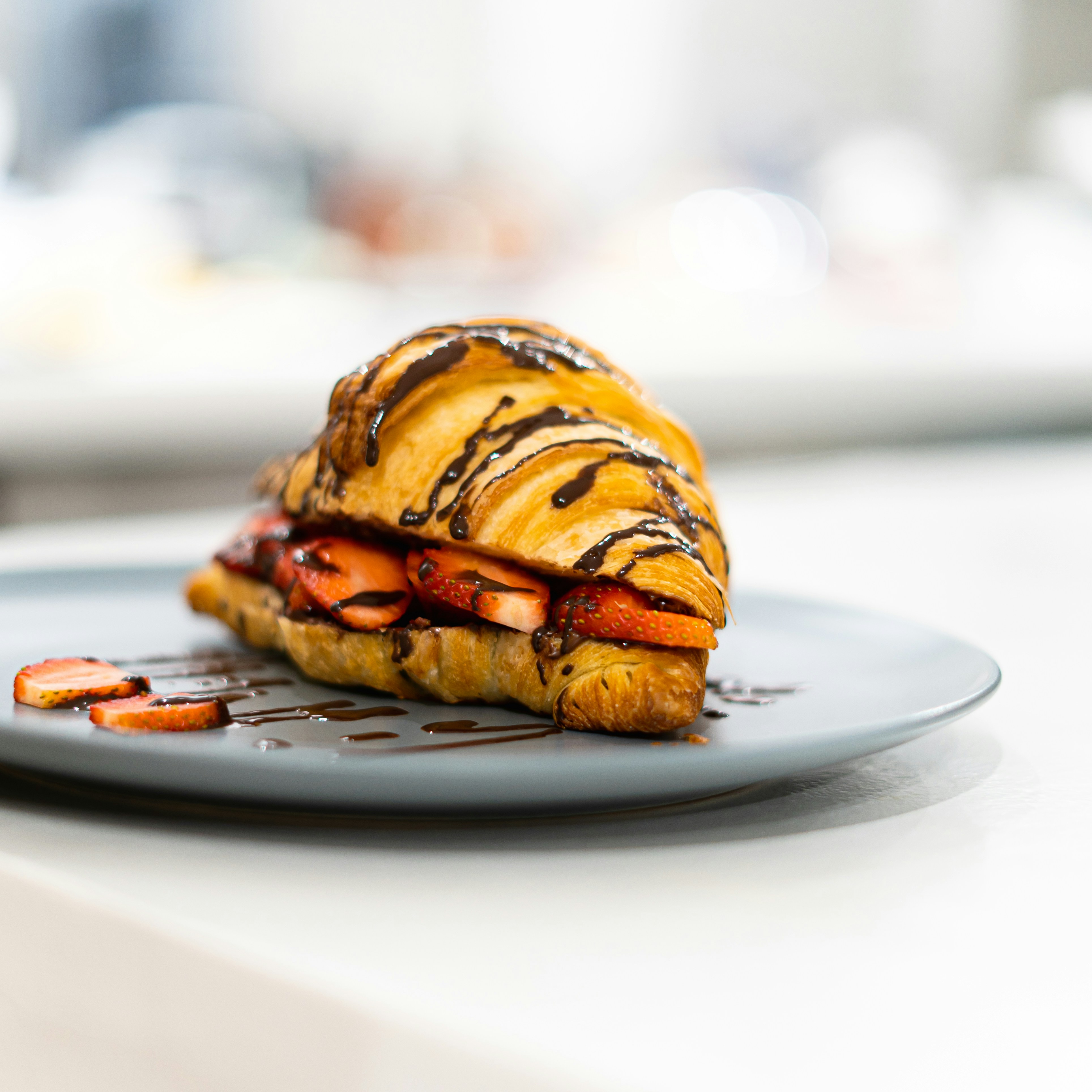 Strawberry-Criced Pastry Drizzle on a Minimal Plate