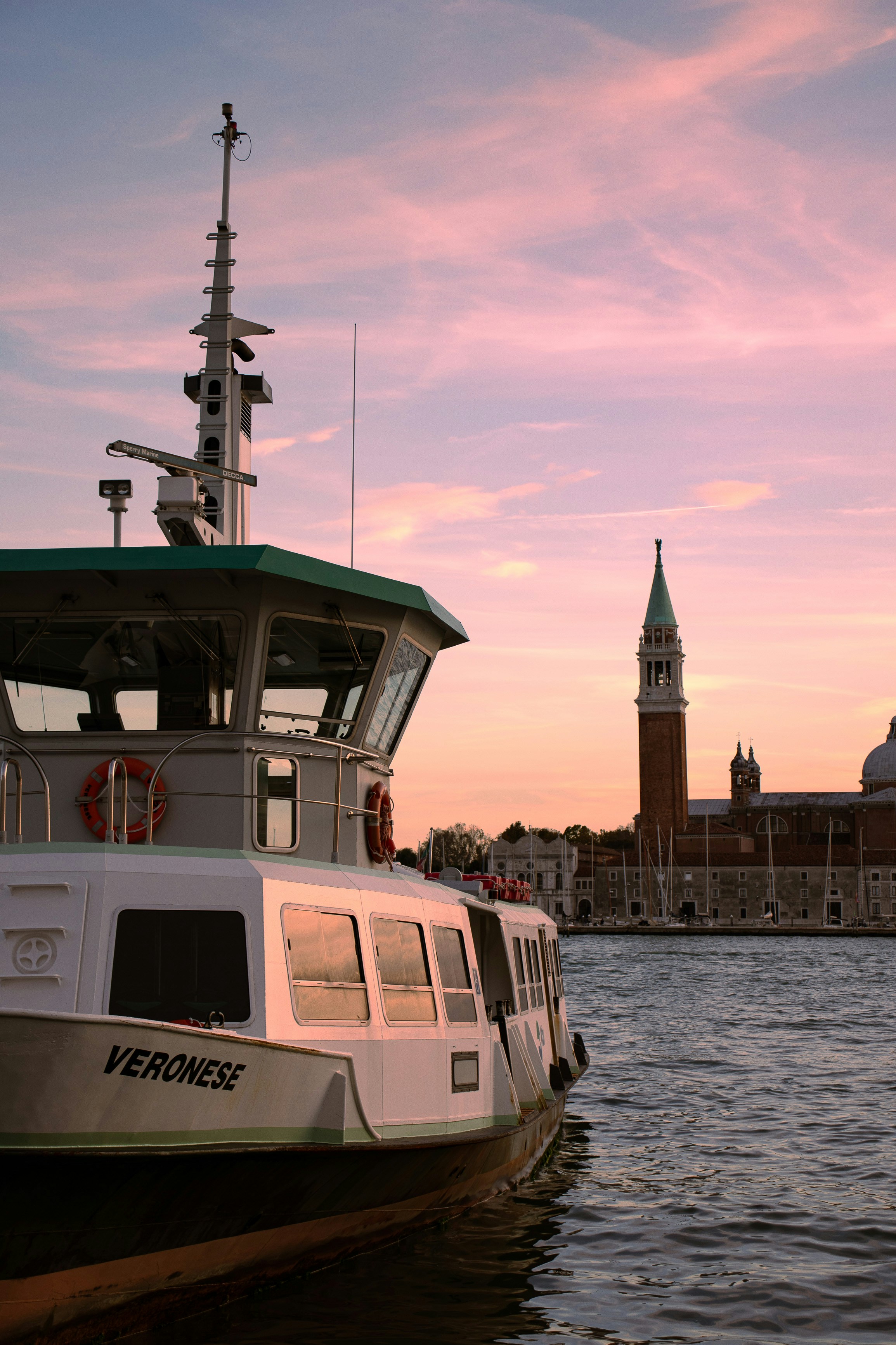 Veronese at Sunset: A Venetian Ferry Against Pink Skies
