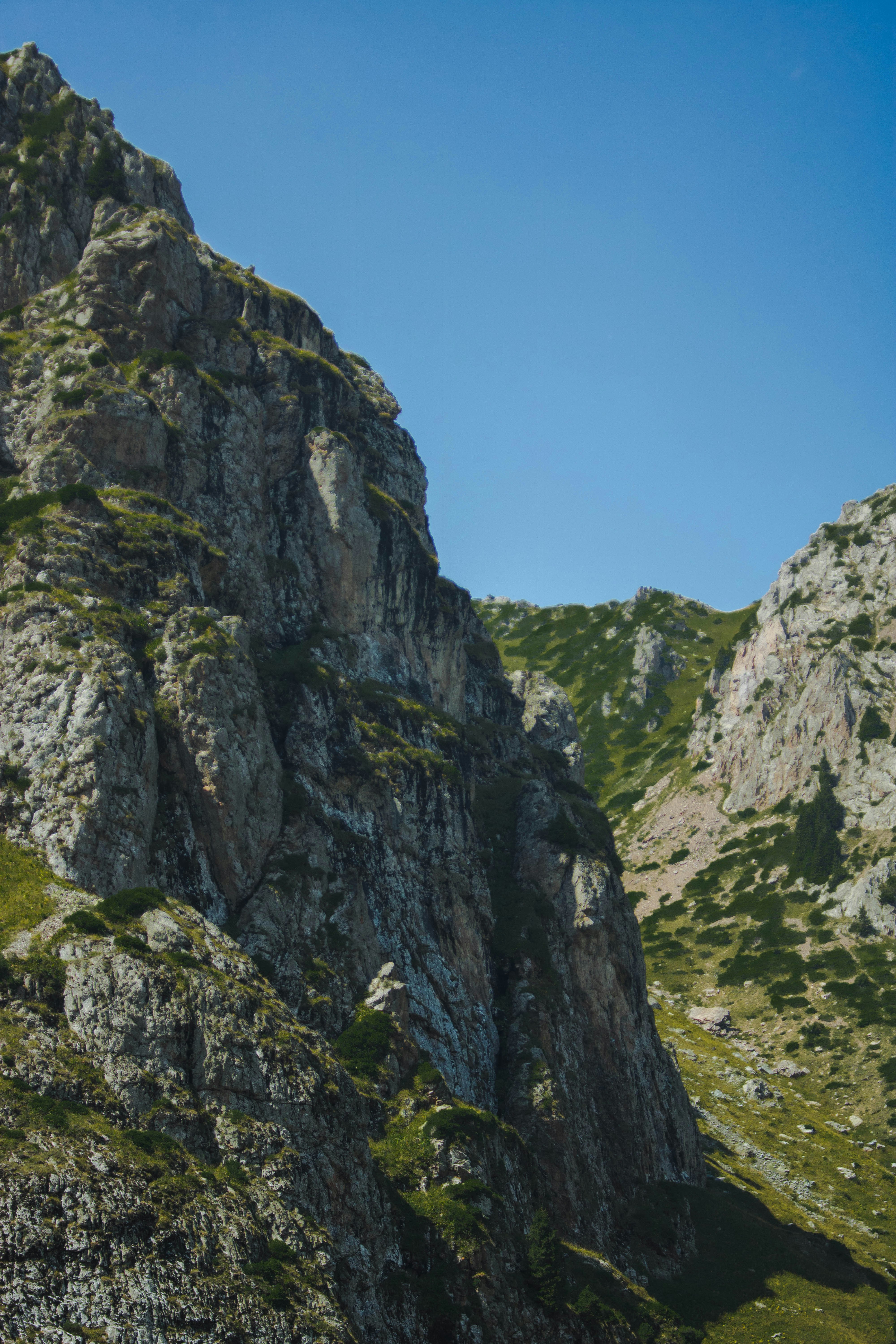 A rocky mountain side photo – Free Rock Image on Unsplash