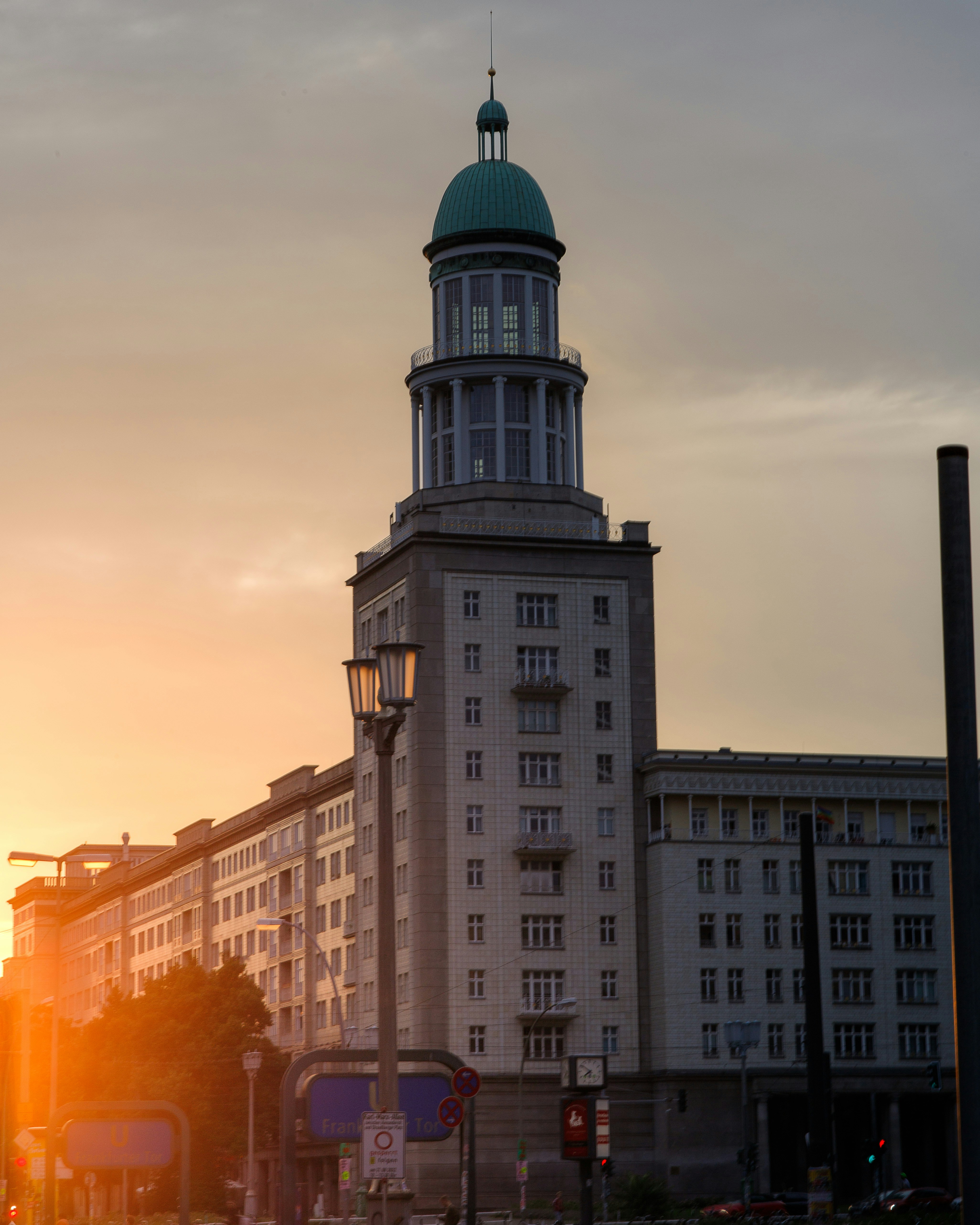 Emerald Cupola at Dusk: A Clocktower's Sunset Silhouette