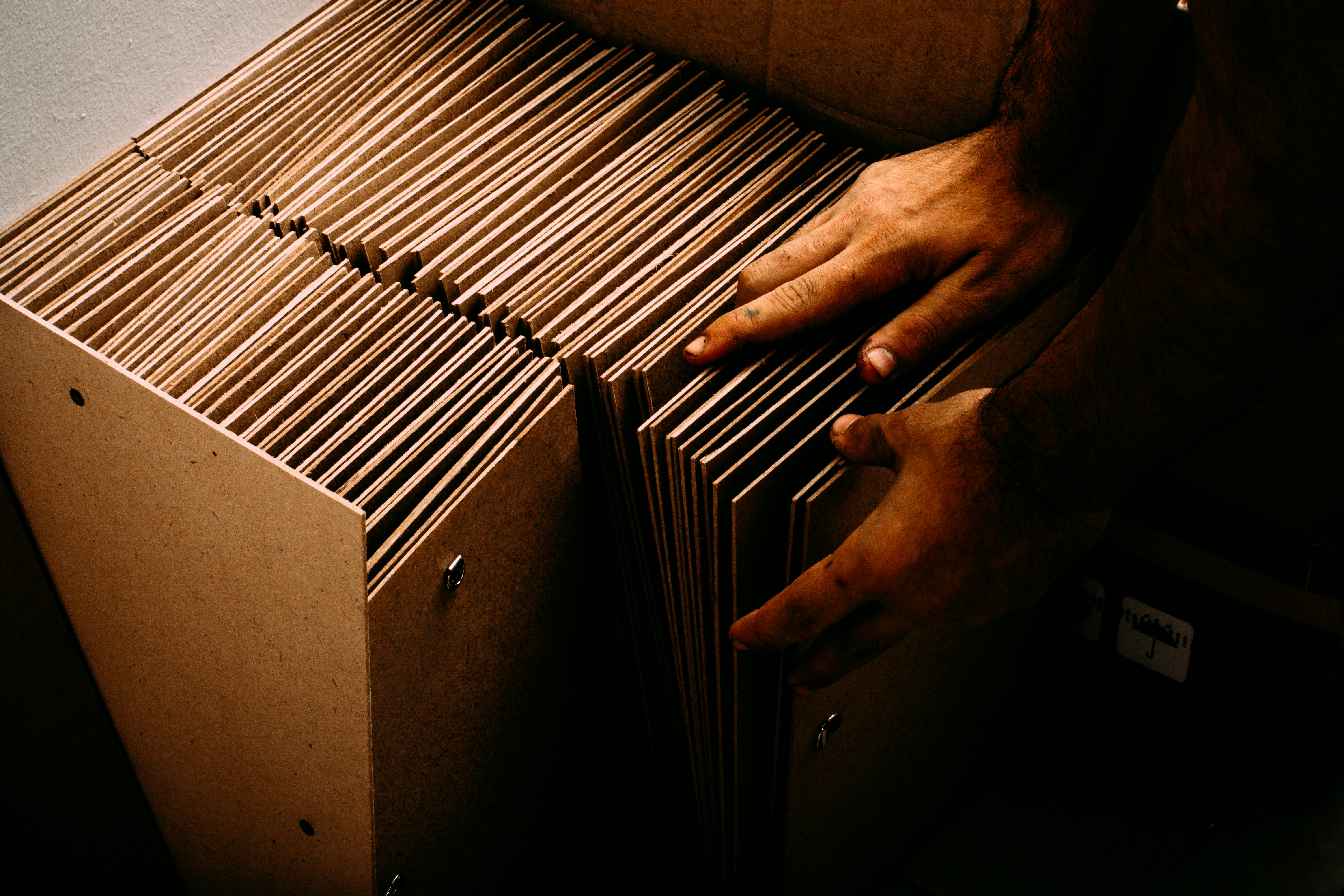 Warm Hands, Narrow Sleeves: Sorting Vintage Record Folders in a Dim Crate