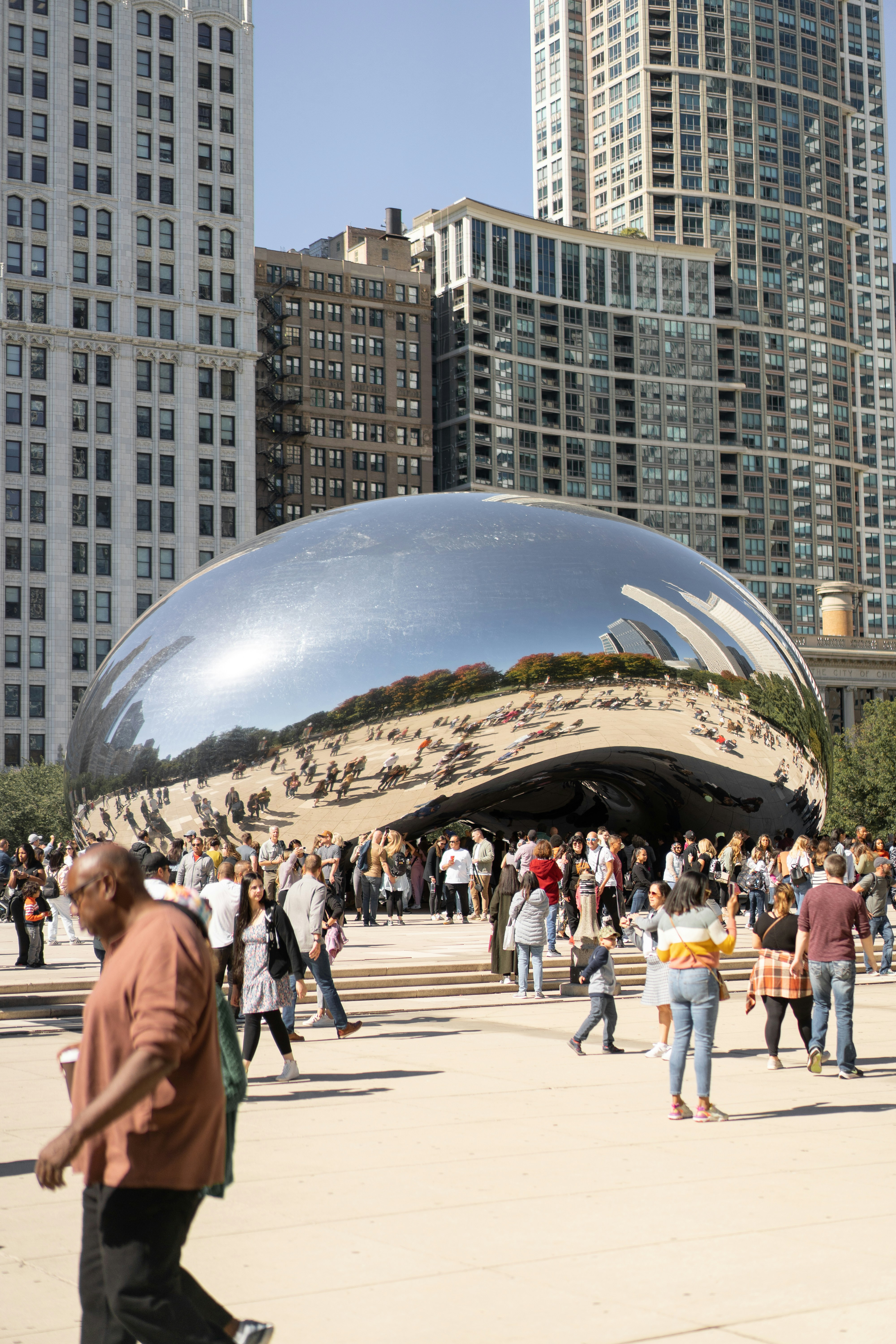 A large reflective sphere surrounded by people photo – Free Chicago ...
