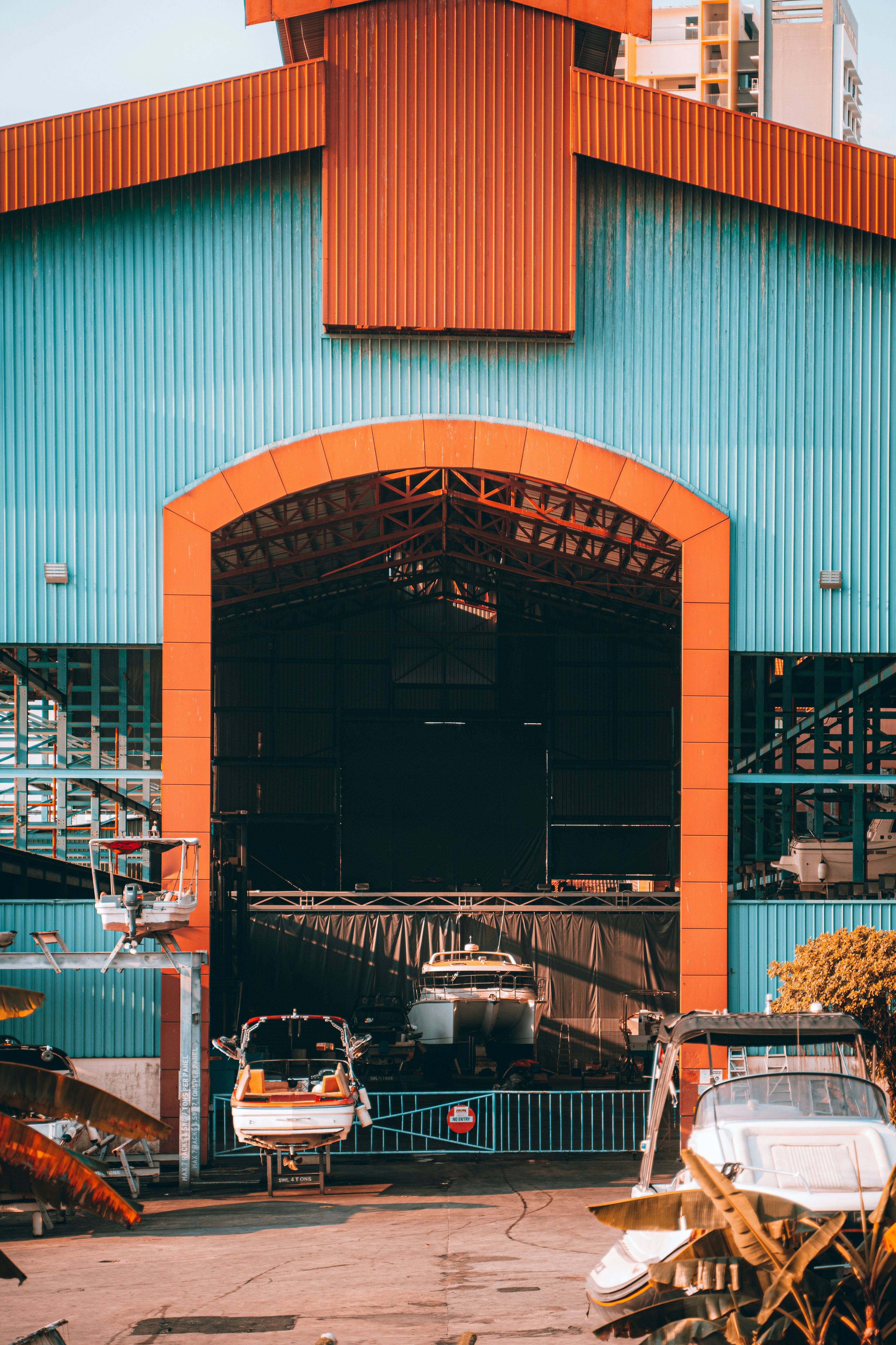A large building with boats in front photo – Free Punggol Image on Unsplash