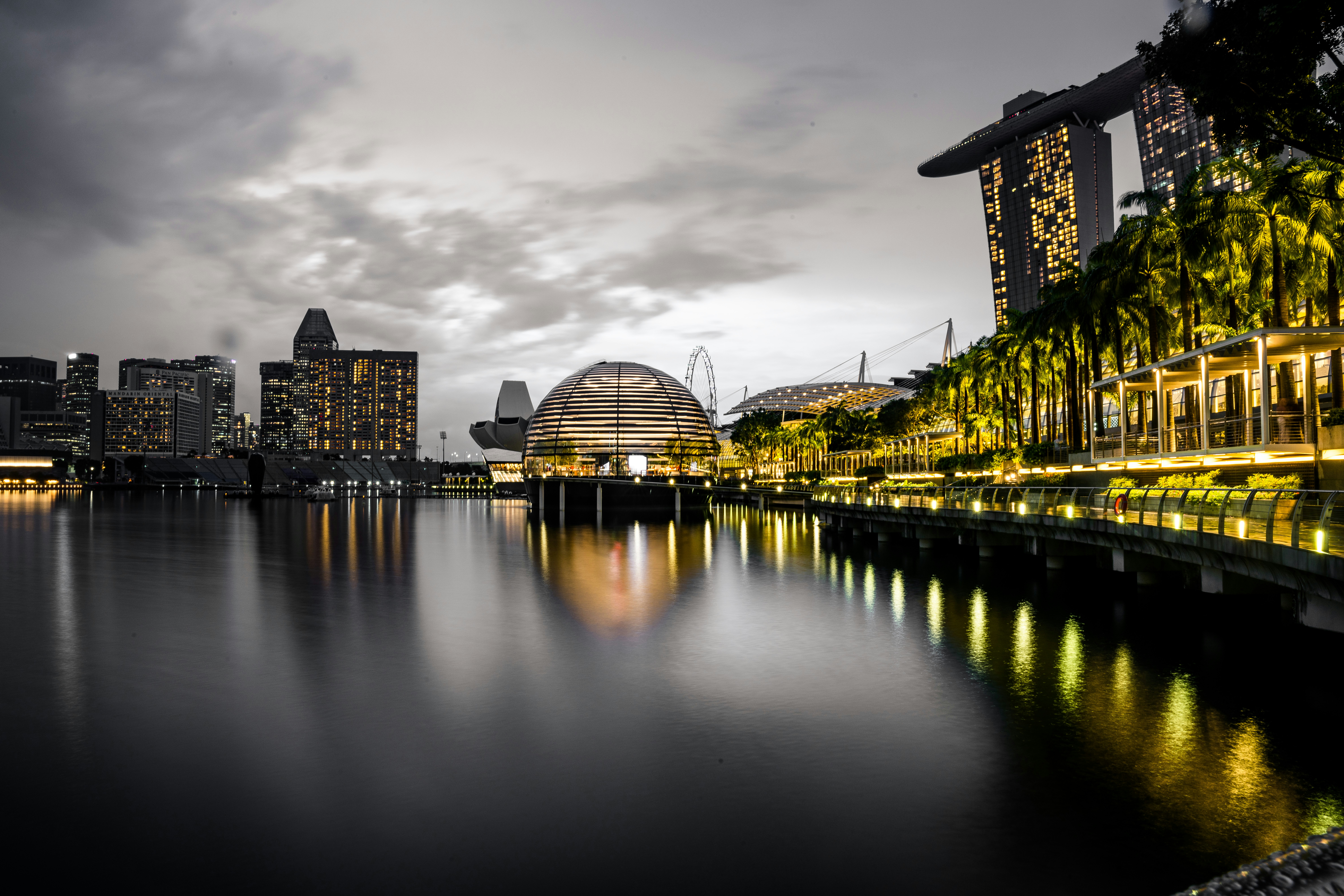 Glass Dome by the Bay: Night Reflections along Marina Bay