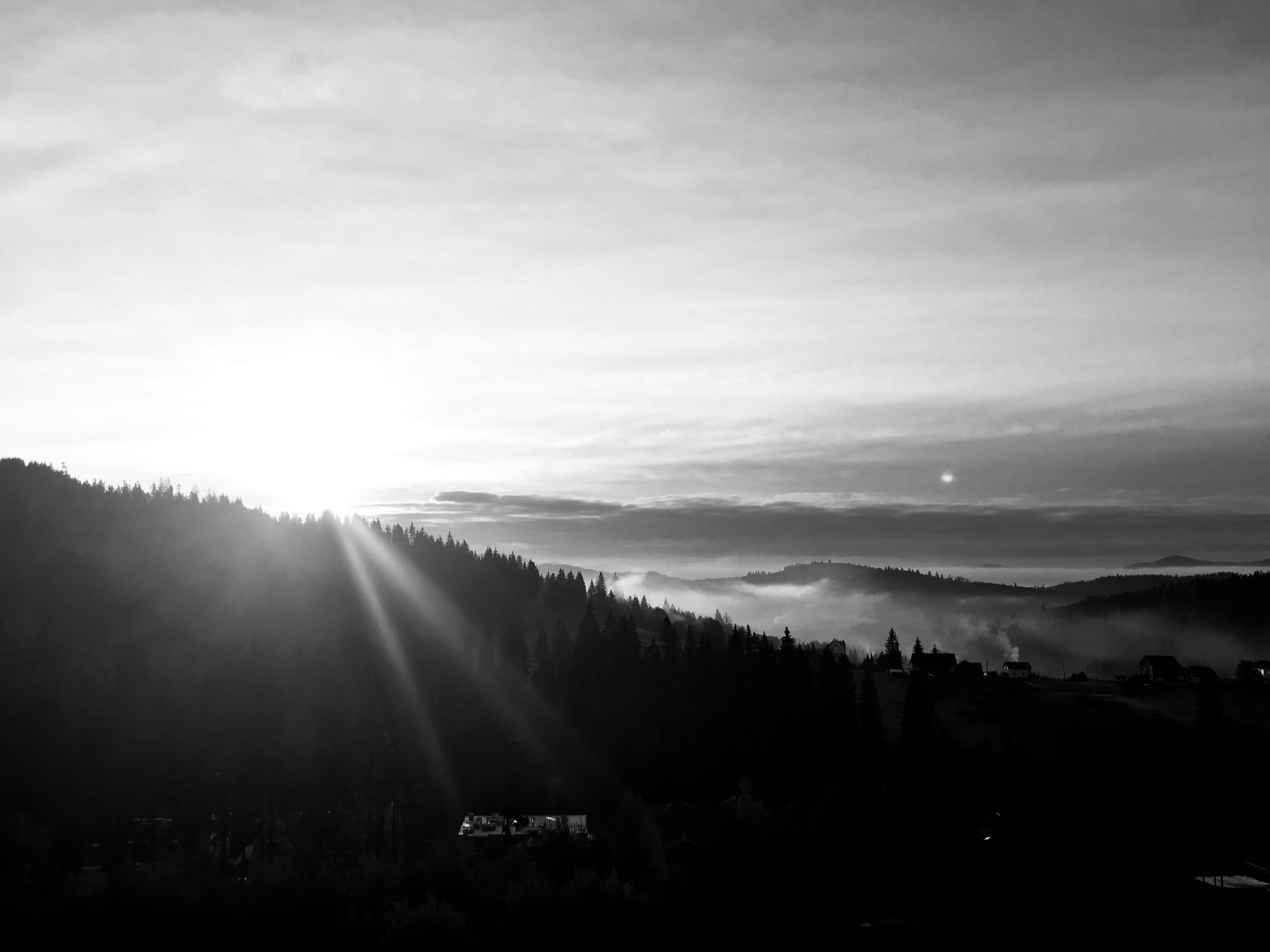 Sunburst Over Misty Ridge