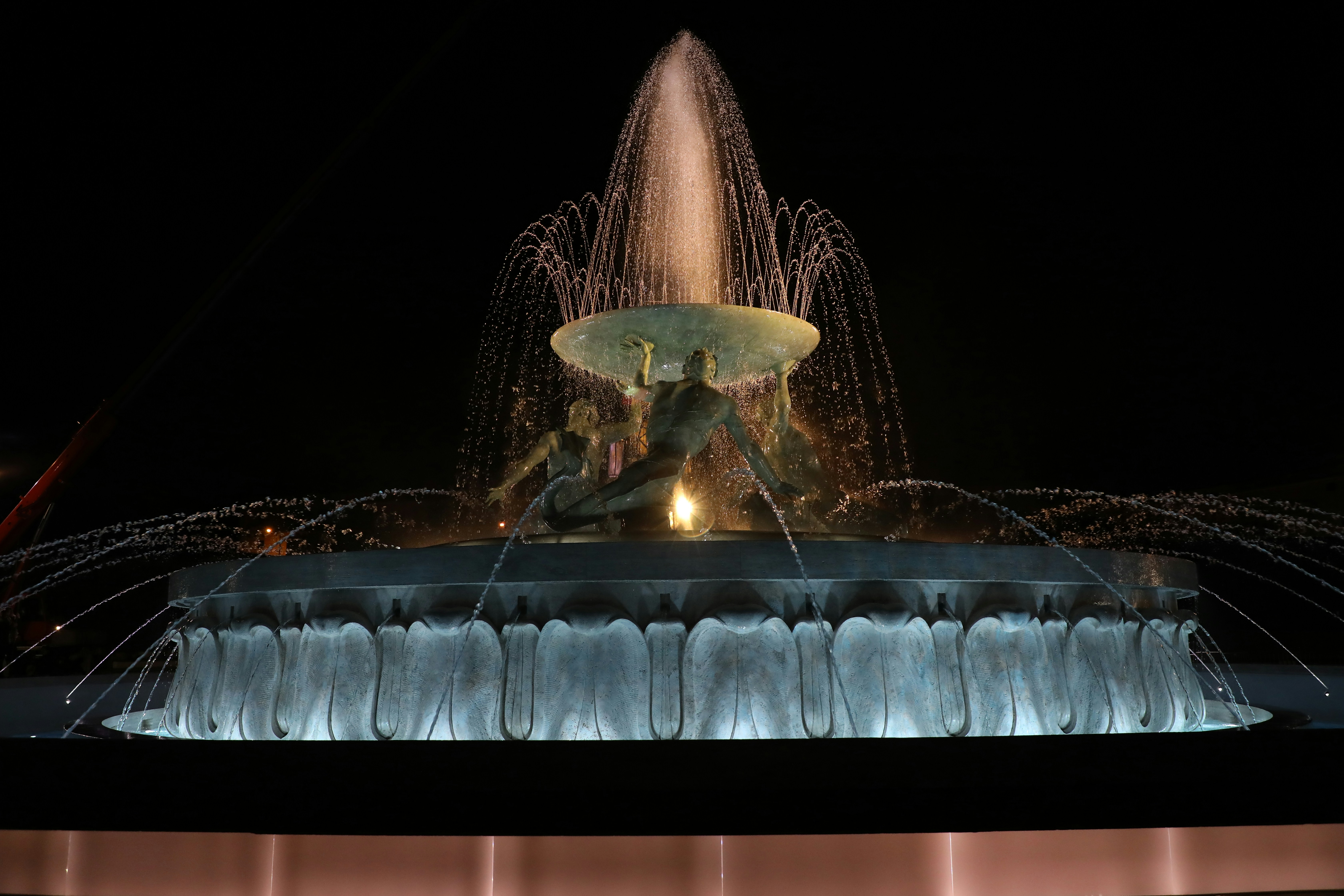 a fountain with water shooting up