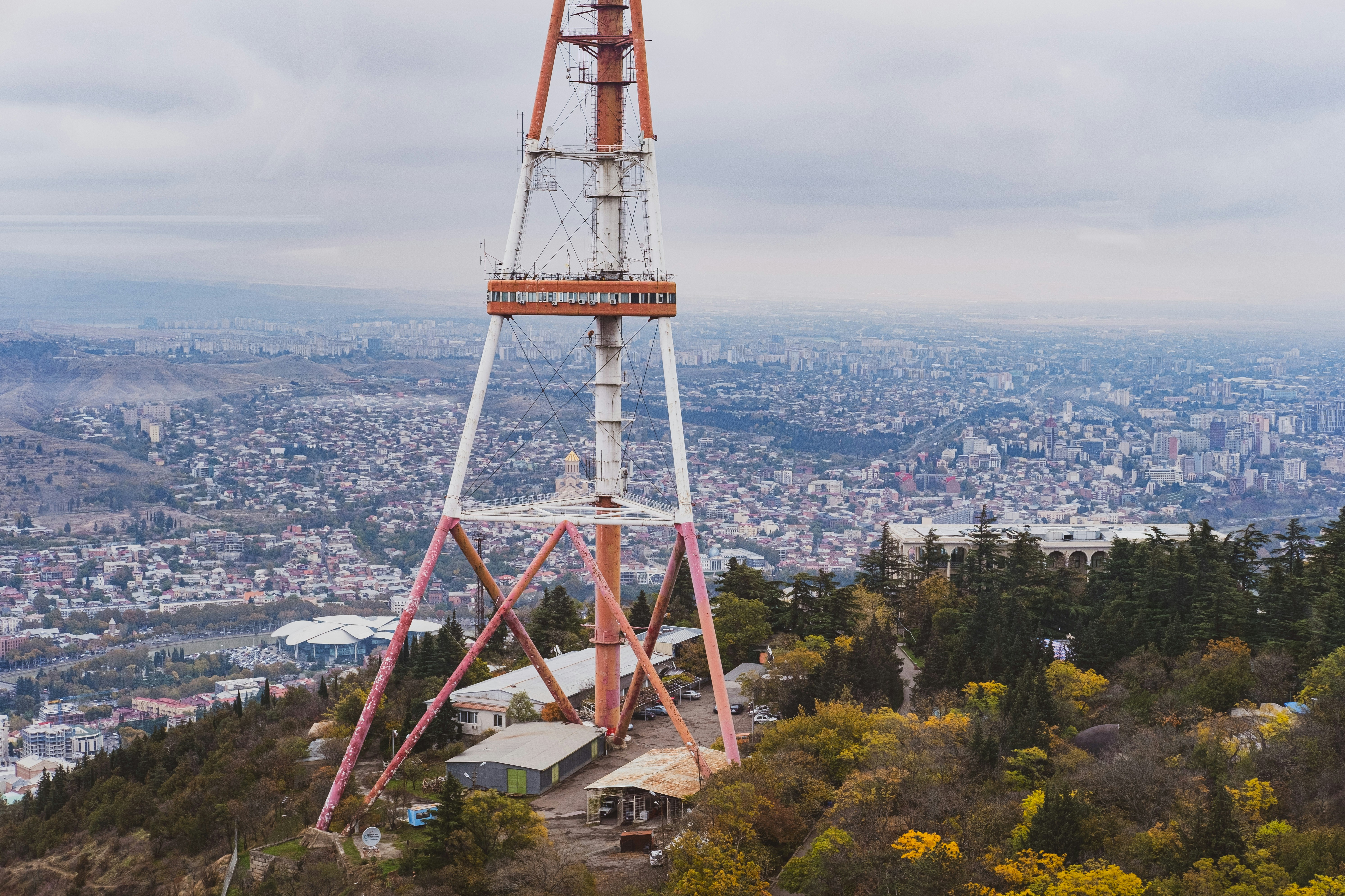 Ridge Summit Signal Tower Framing a Cityscape