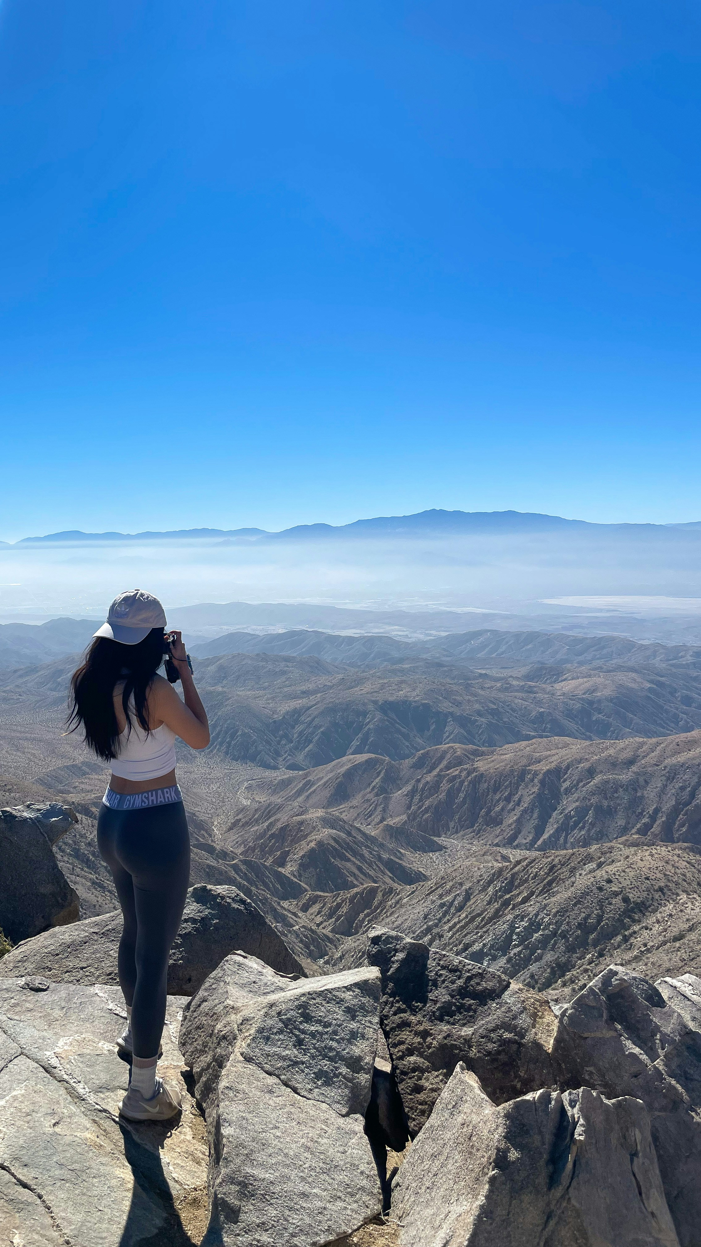 Cliffside Portrait: A Quiet Moment Above the Valley
