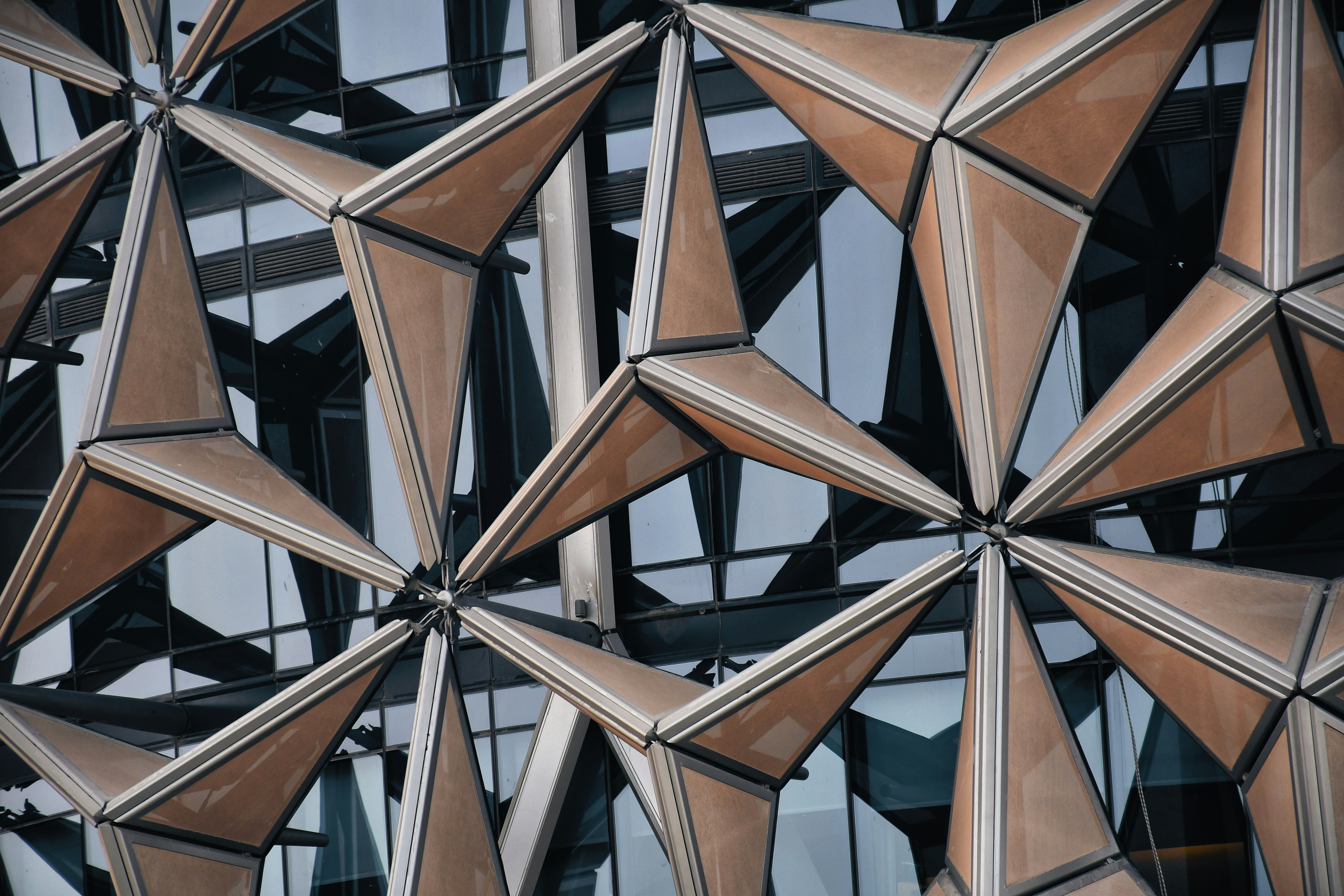 Triangular Convergence: The Metallic Tessellation of a Modern Facade