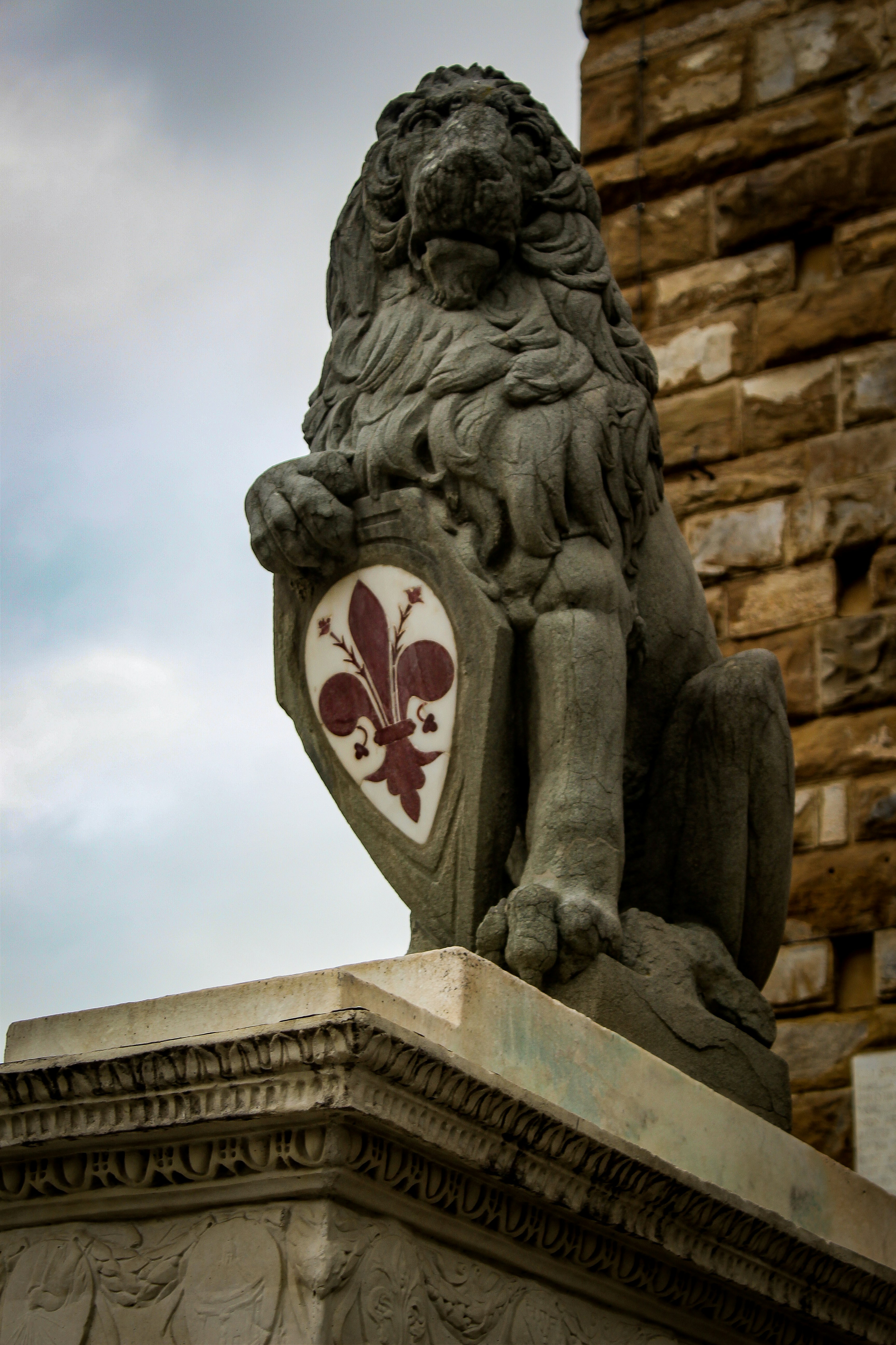 A statue of a lion photo – Free Adult Image on Unsplash