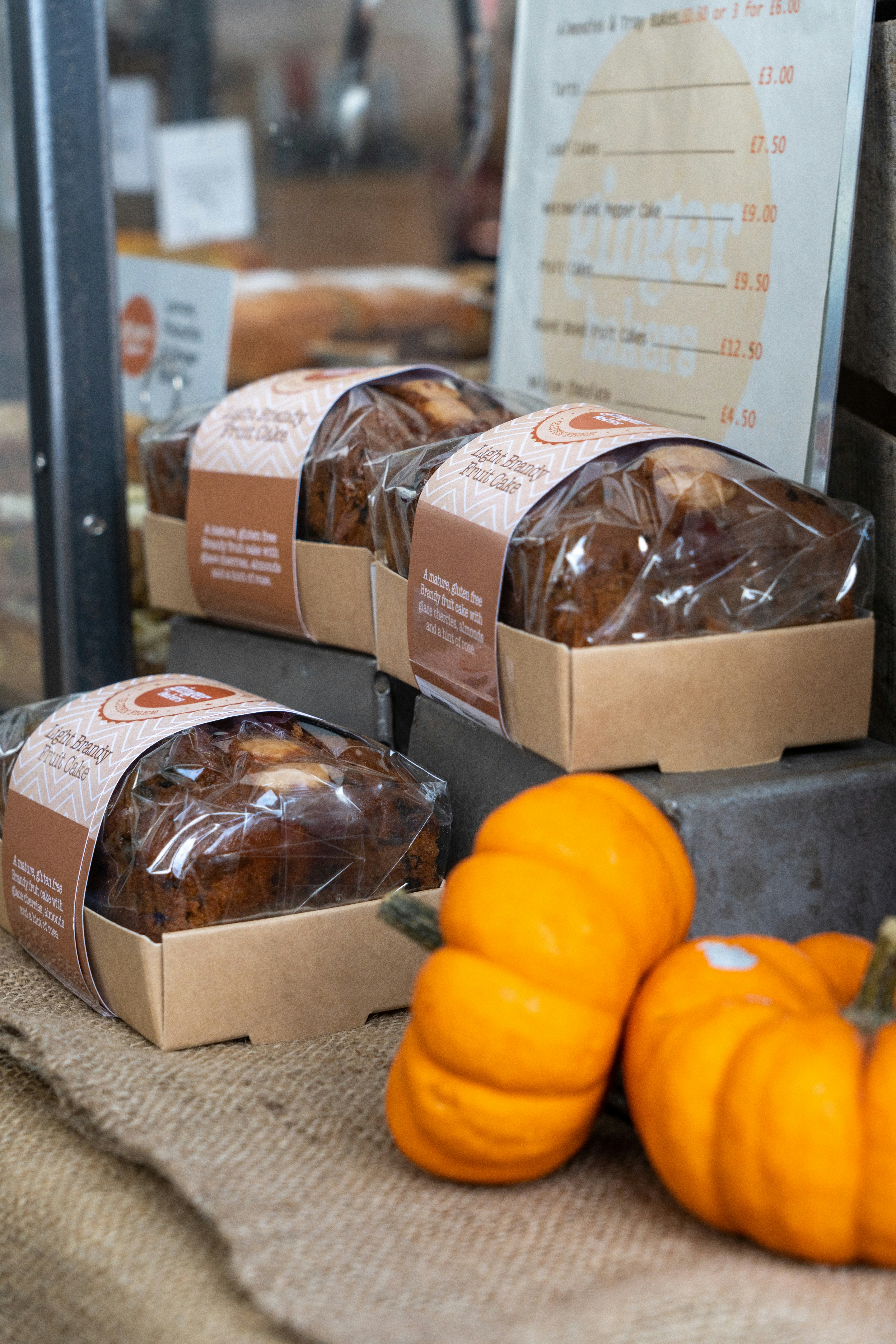Cakes on a Shelf: Warm Loaves and Small Pumpkins