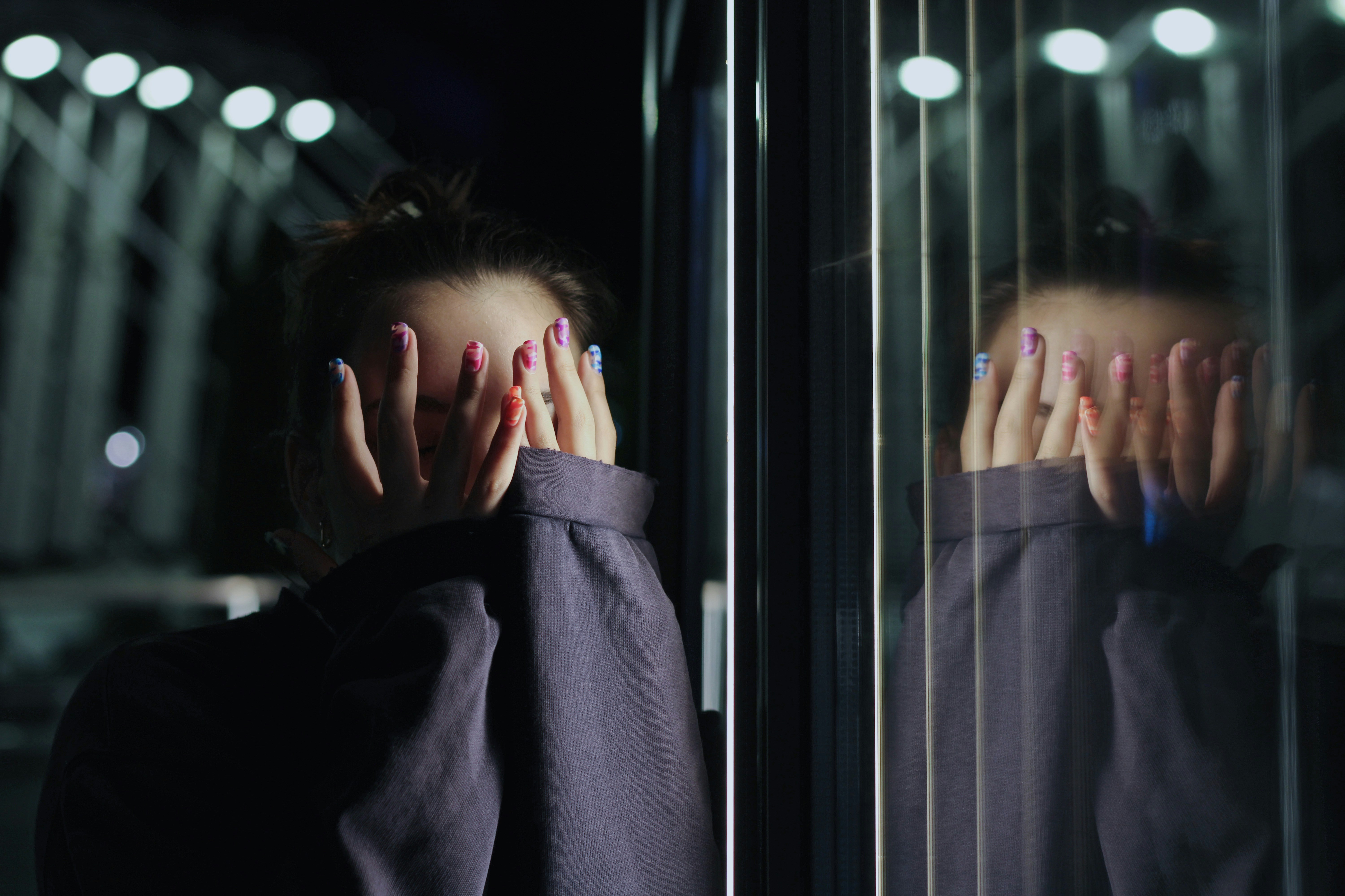 A person holding the hands to the face photo – Free Face Image on Unsplash