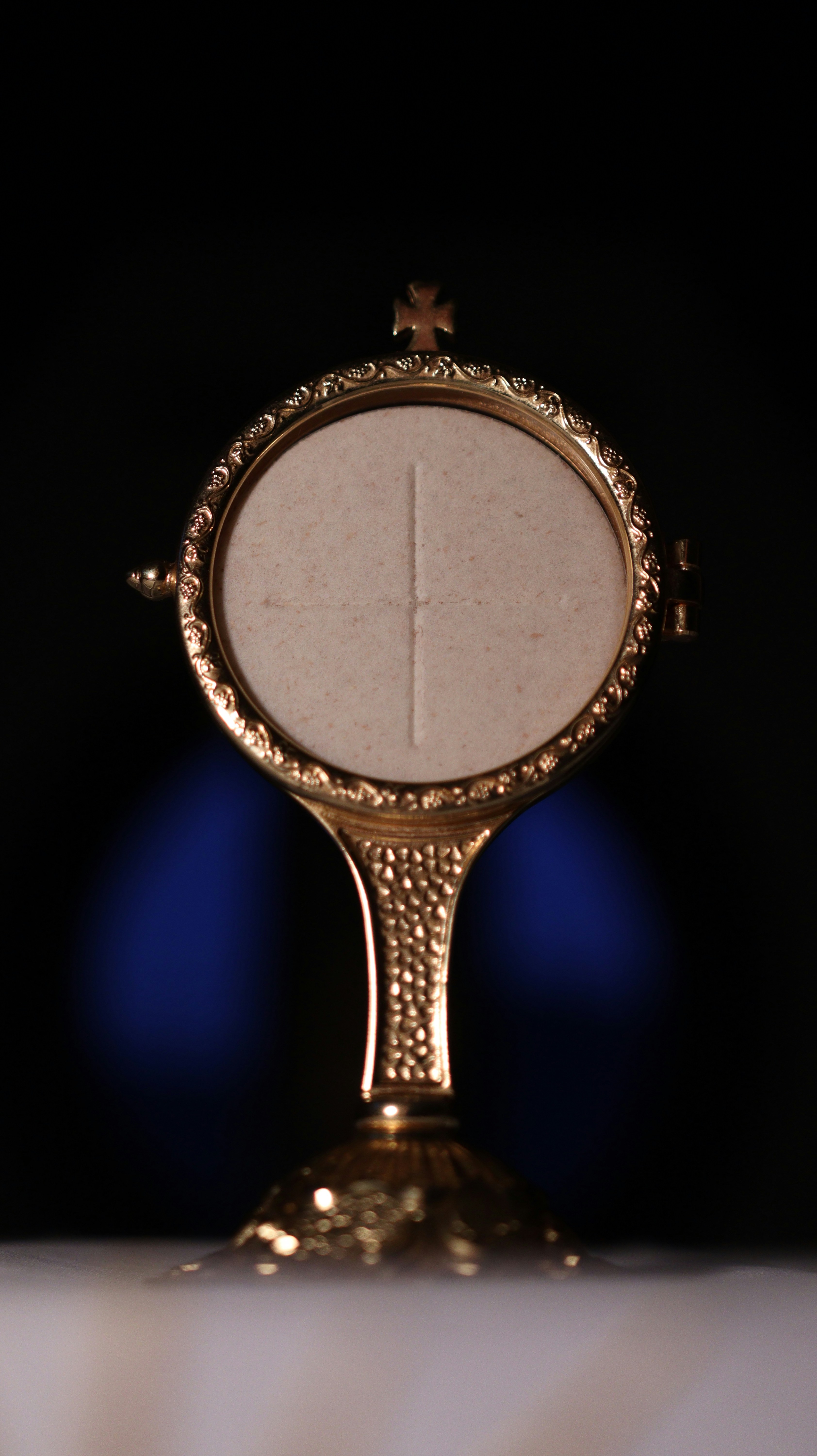 Gilded Round Mirror with Crosshair Face in Velvet Darkness