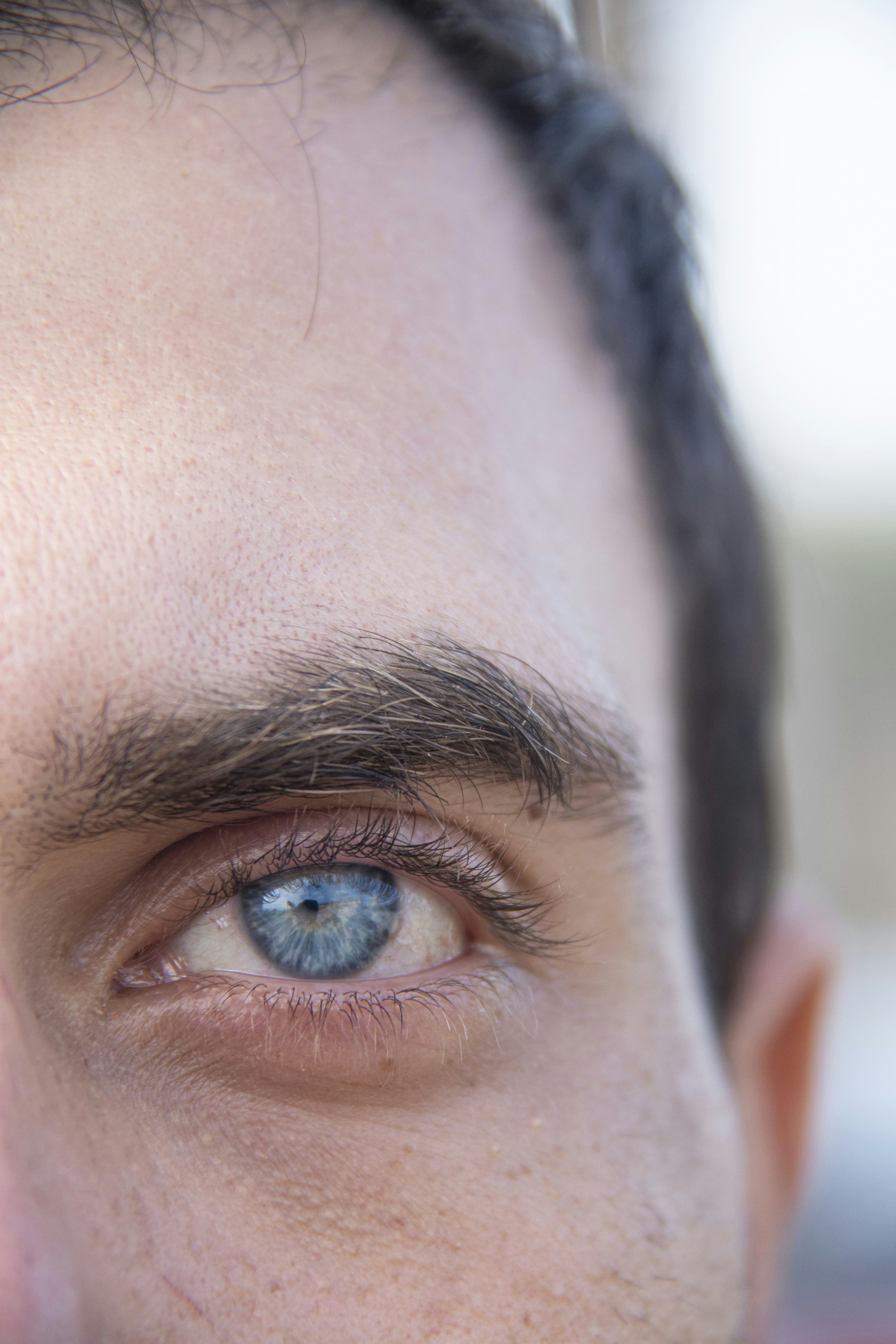 A close up of a person's eye photo – Free Man Image on Unsplash