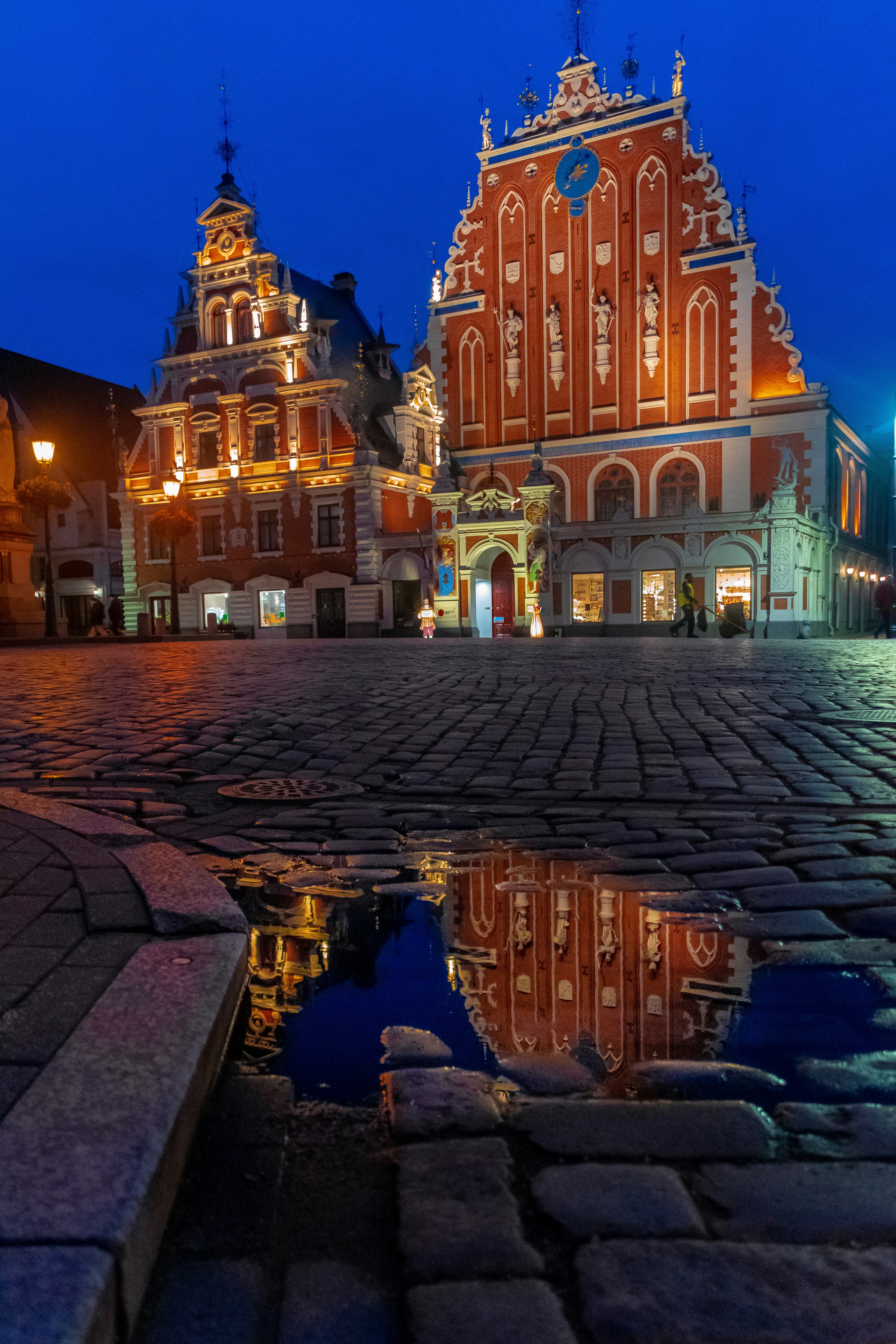 Stairway to Nightfall: Illuminated Gothic Facades Reaching Skyward