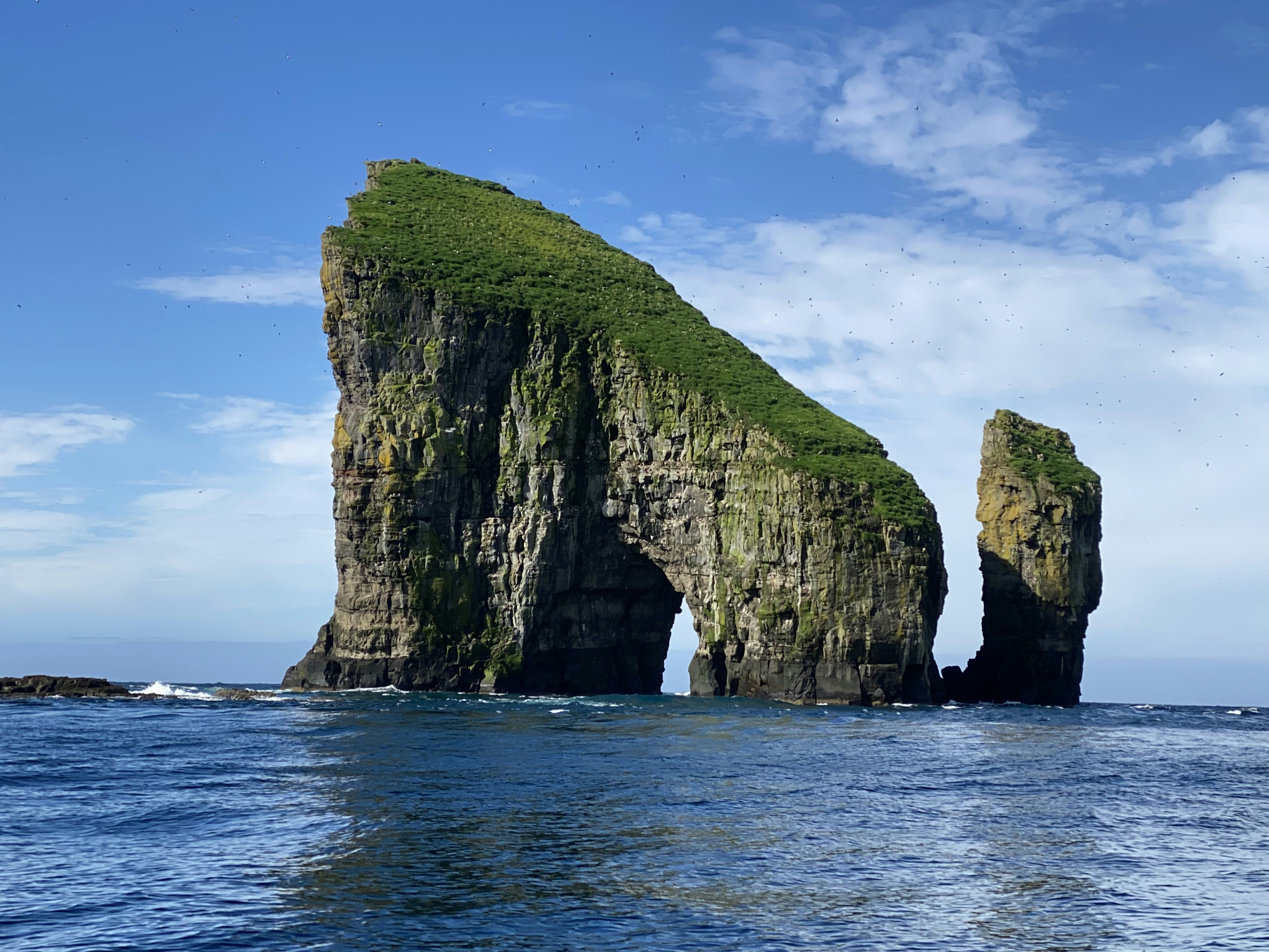 A large rock formation in the water photo – Free Faroe islands Image on ...