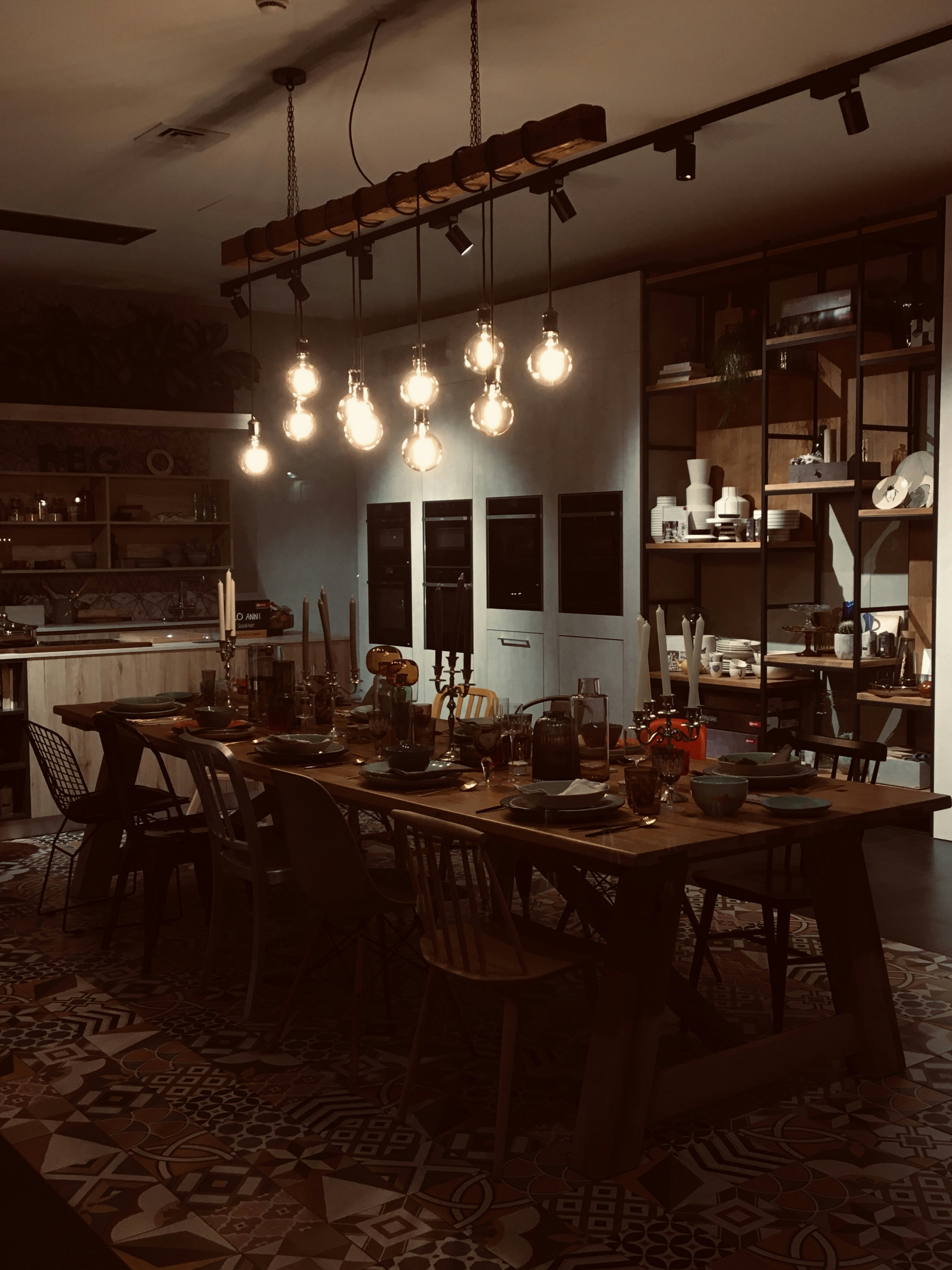 Dimly Lit Dining Hall with Hanging Edison Bulbs