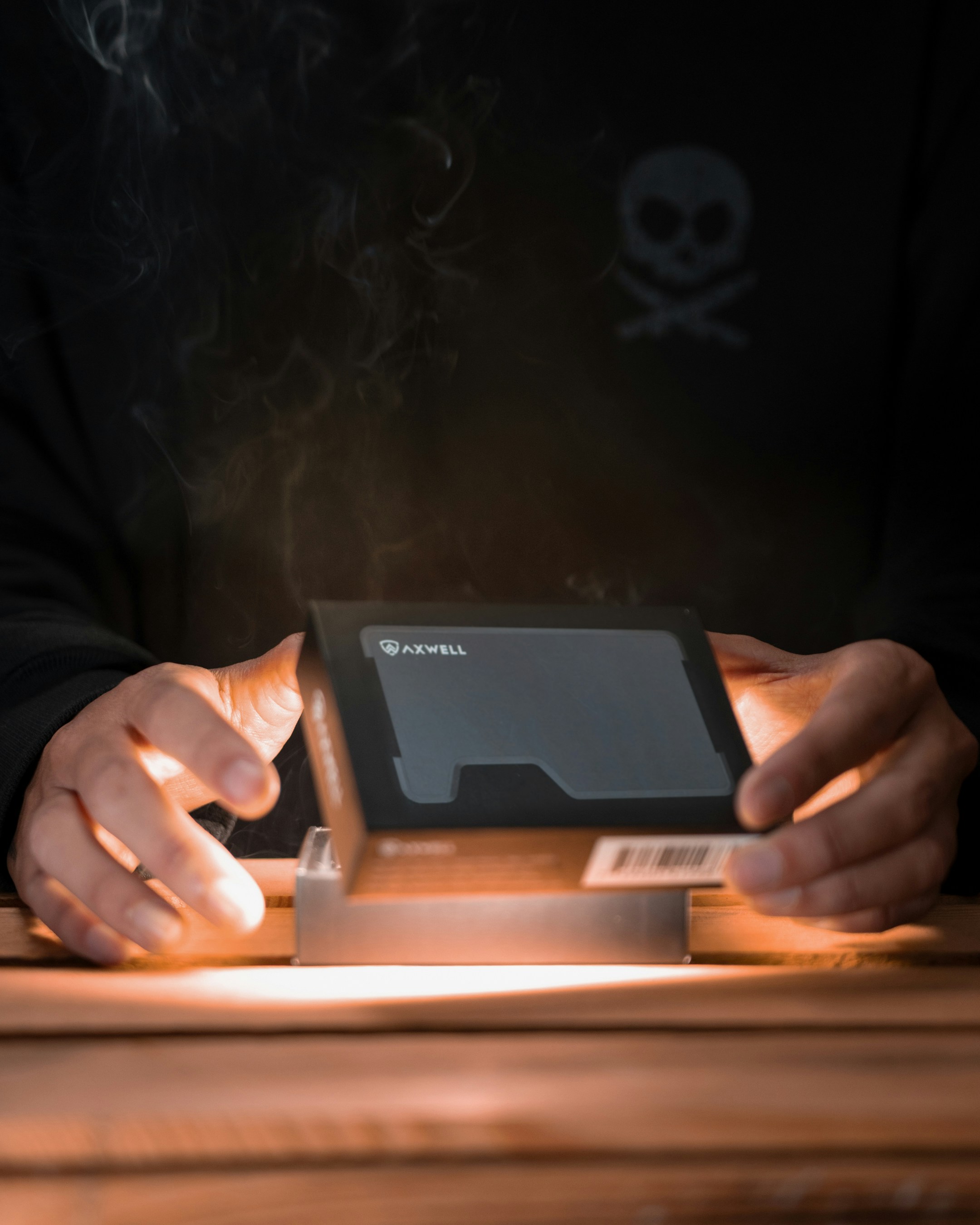 Glowing USB Drive: Hands Hover Over a Small Sand-colored Dock