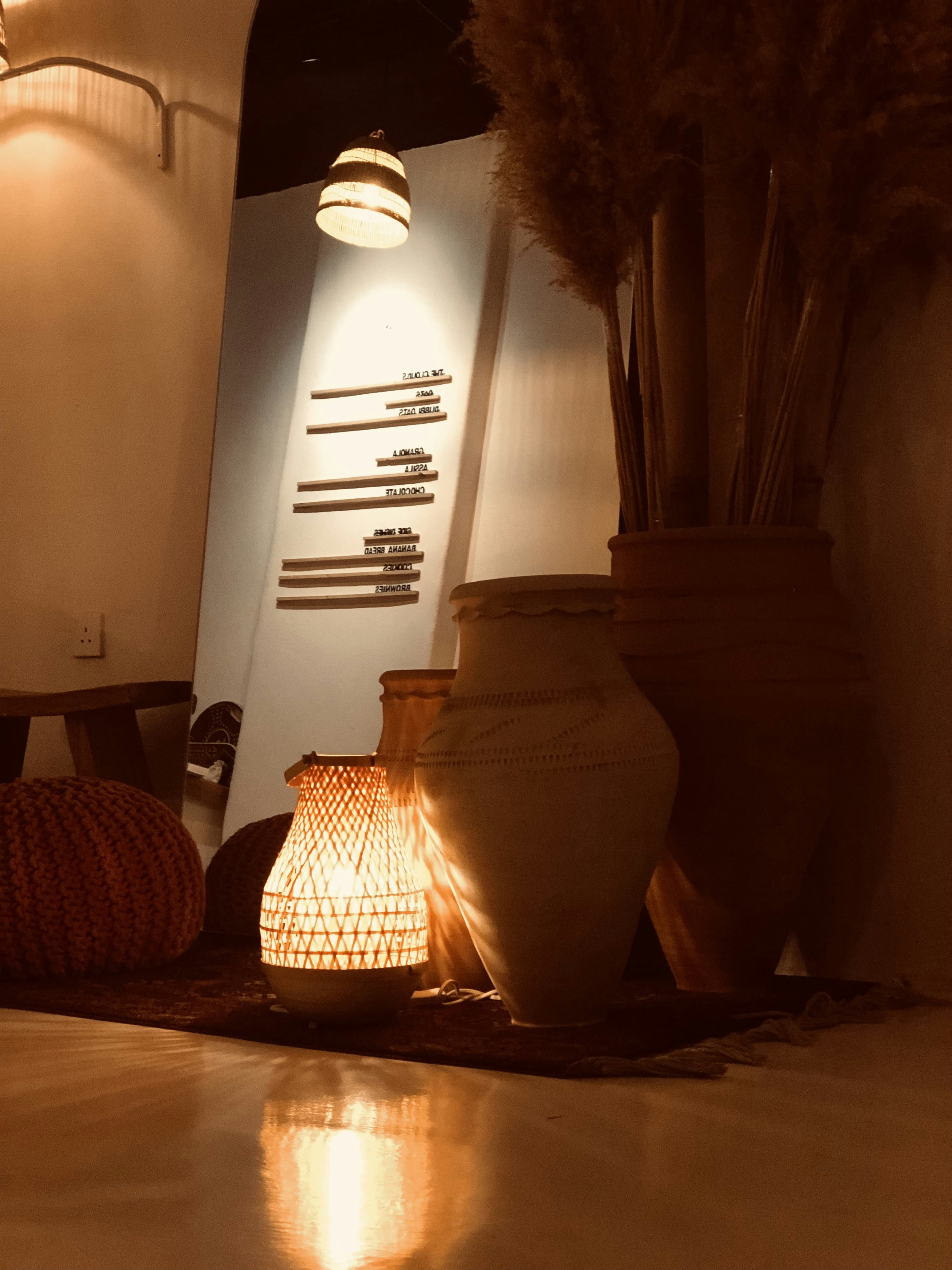 Amber Glow Among Ceramics: A Quiet Indoor Still Life