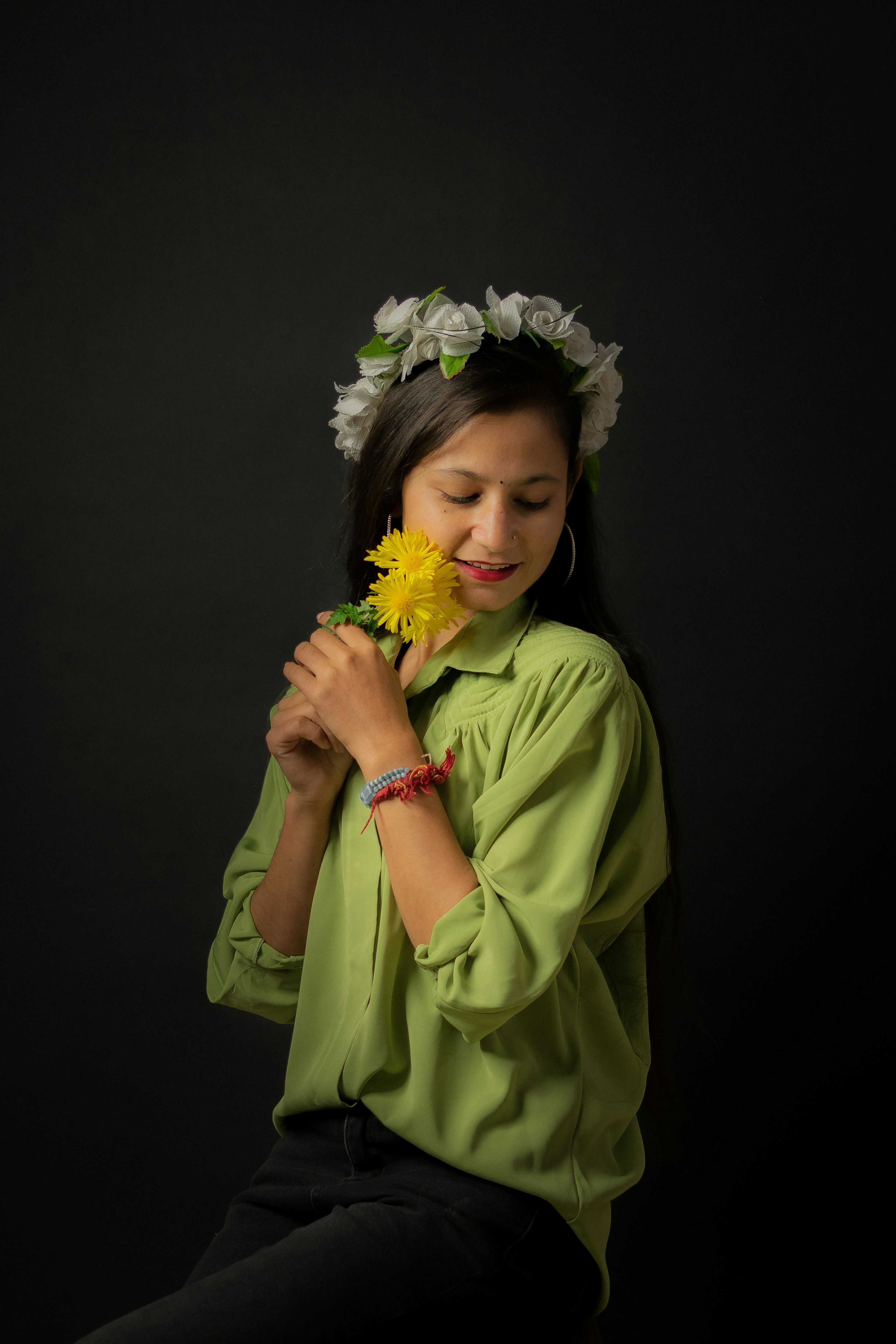 Green Silk and Yellow Bloom: A Quiet Portrait with a Daisy Crown